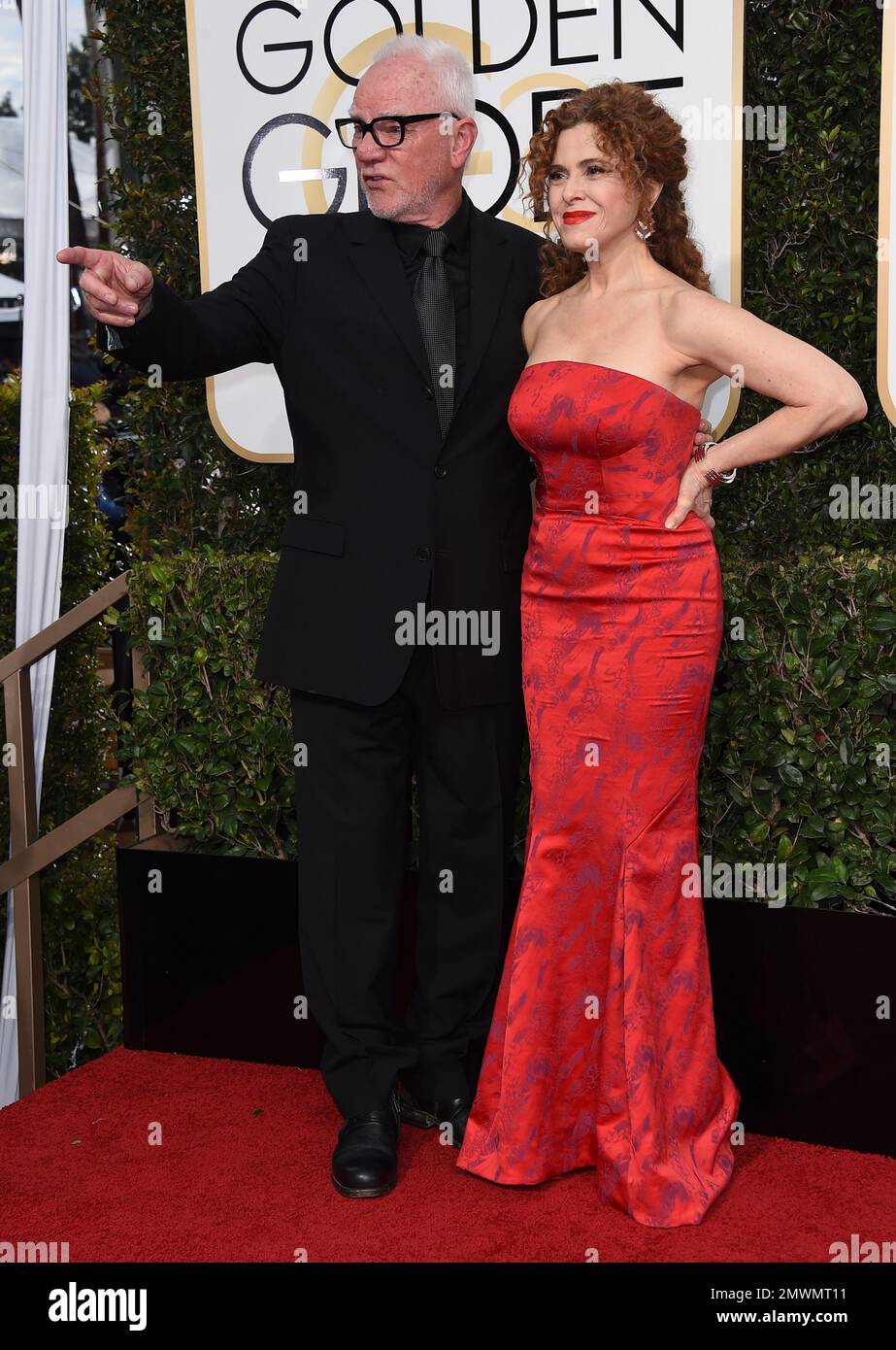Malcolm McDowell, left, and Bernadette Peters arrive at the 74th annual ...