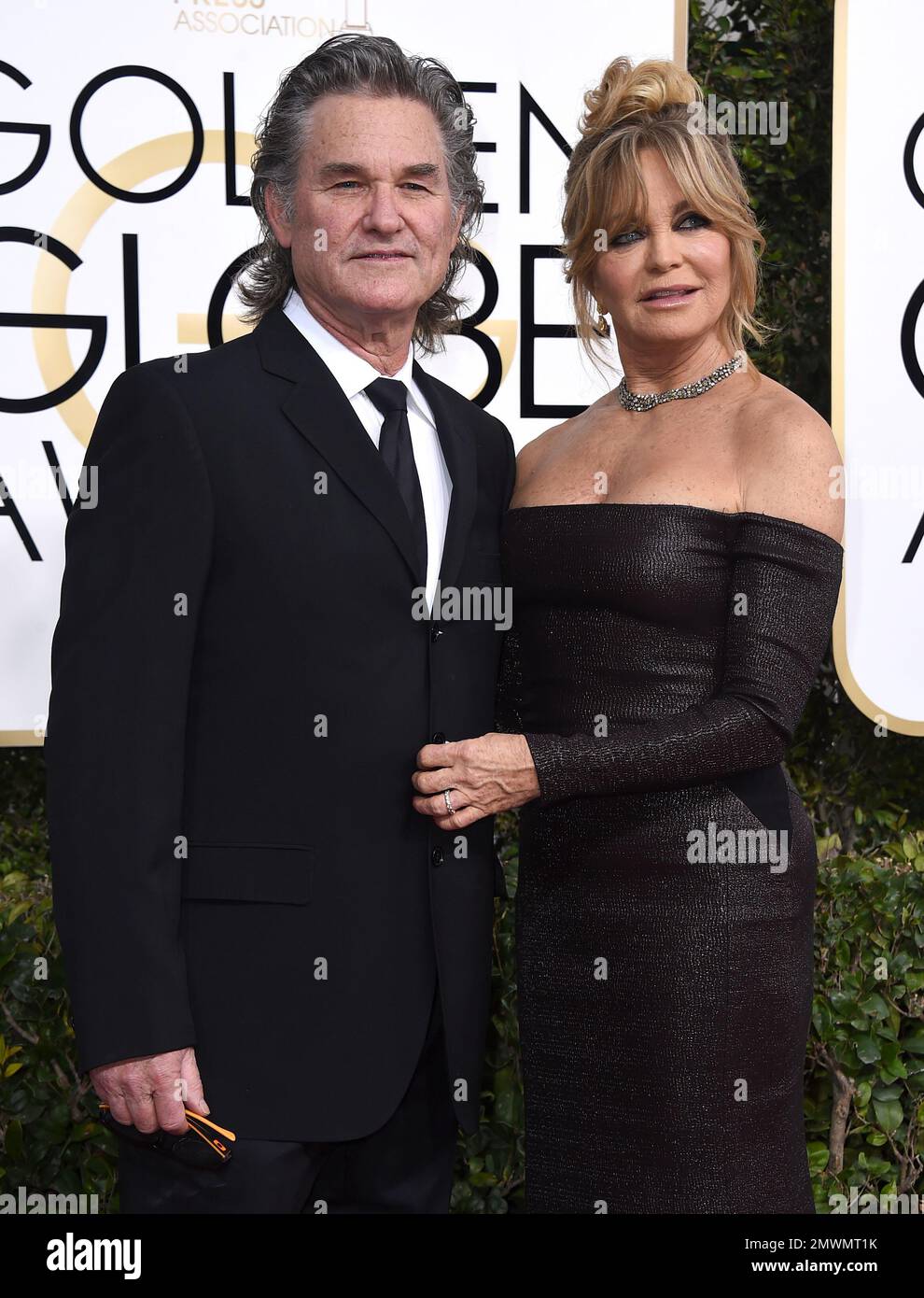 Kurt Russell, left, and Goldie Hawn arrive at the 74th annual Golden ...