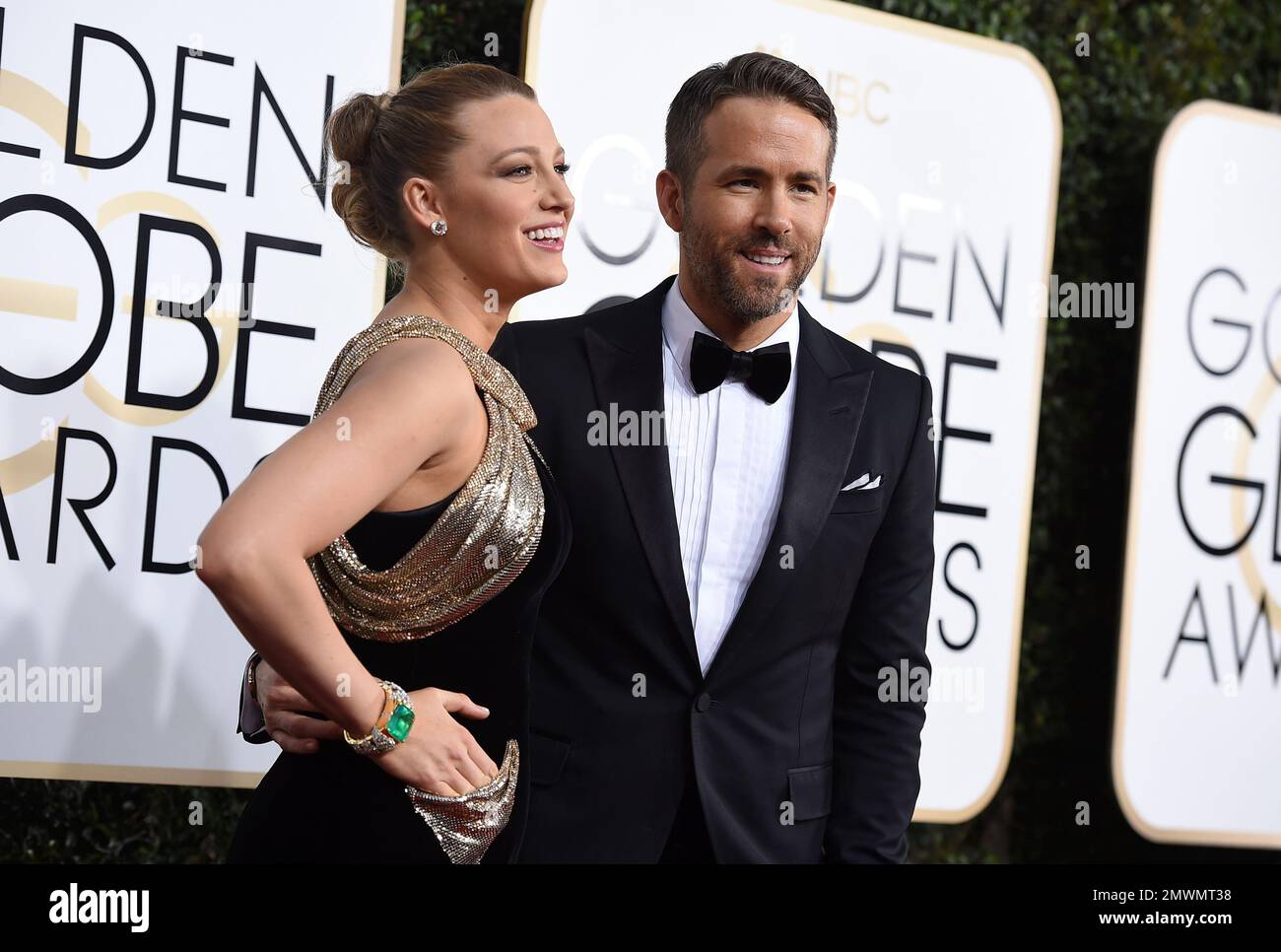 Blake Lively, left, and Ryan Reynolds arrive at the 74th annual Golden ...