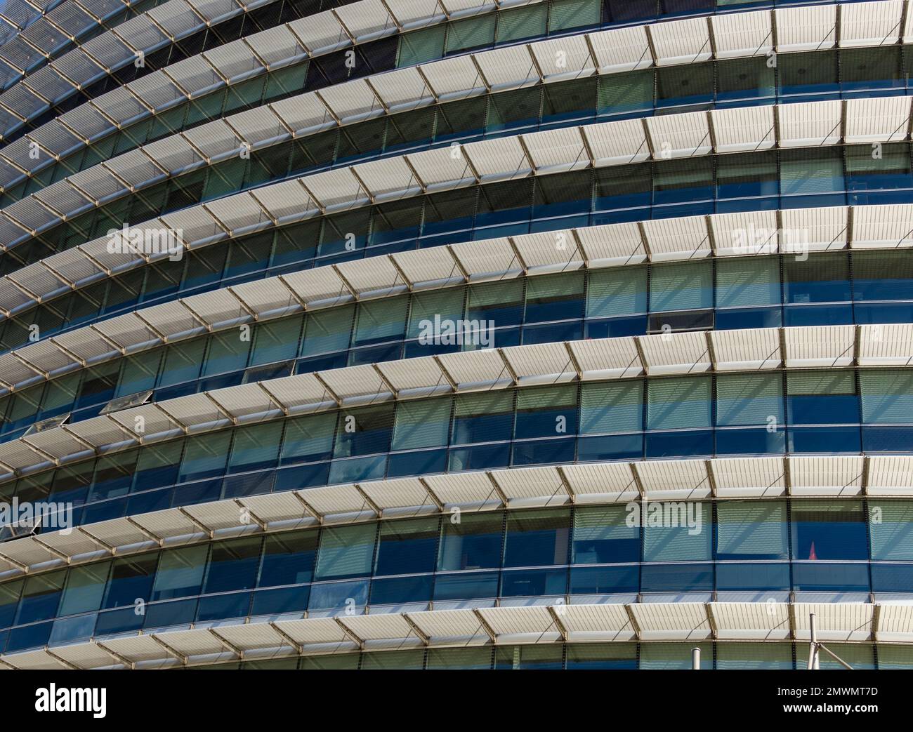 A Semicircular building with large windows Stock Photo - Alamy