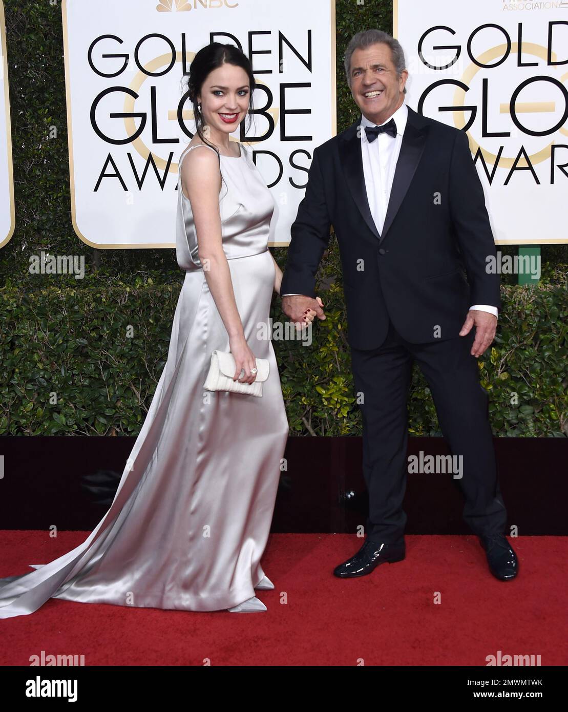 Rosalind Ross, left, and Mel Gibson arrive at the 74th annual Golden ...