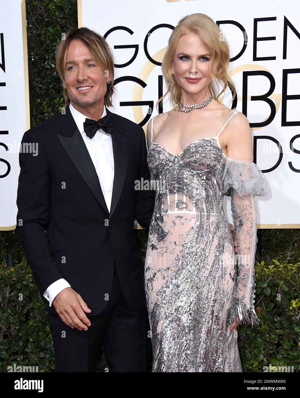 Keith Urban, left, and Nicole Kidman arrive at the 74th annual Golden ...