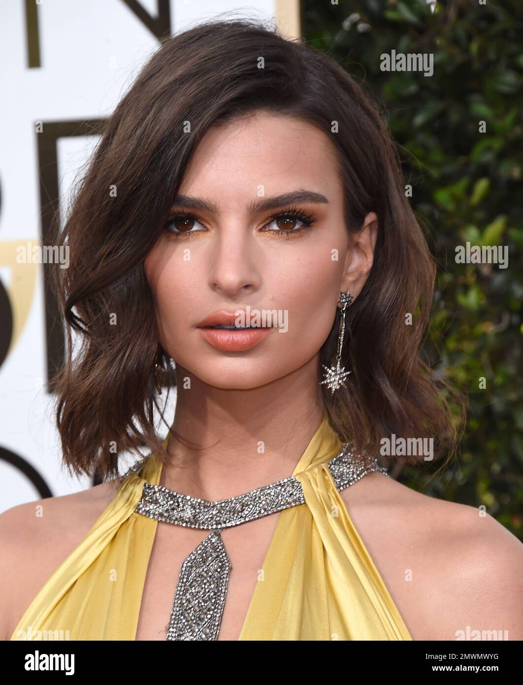 Emily Ratajkowski arrives at the 74th annual Golden Globe Awards at the ...