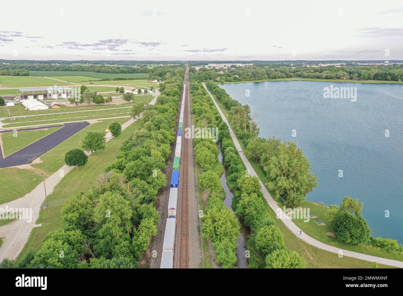 An aerial view of a train transporting cargo containers Stock Photo - Alamy