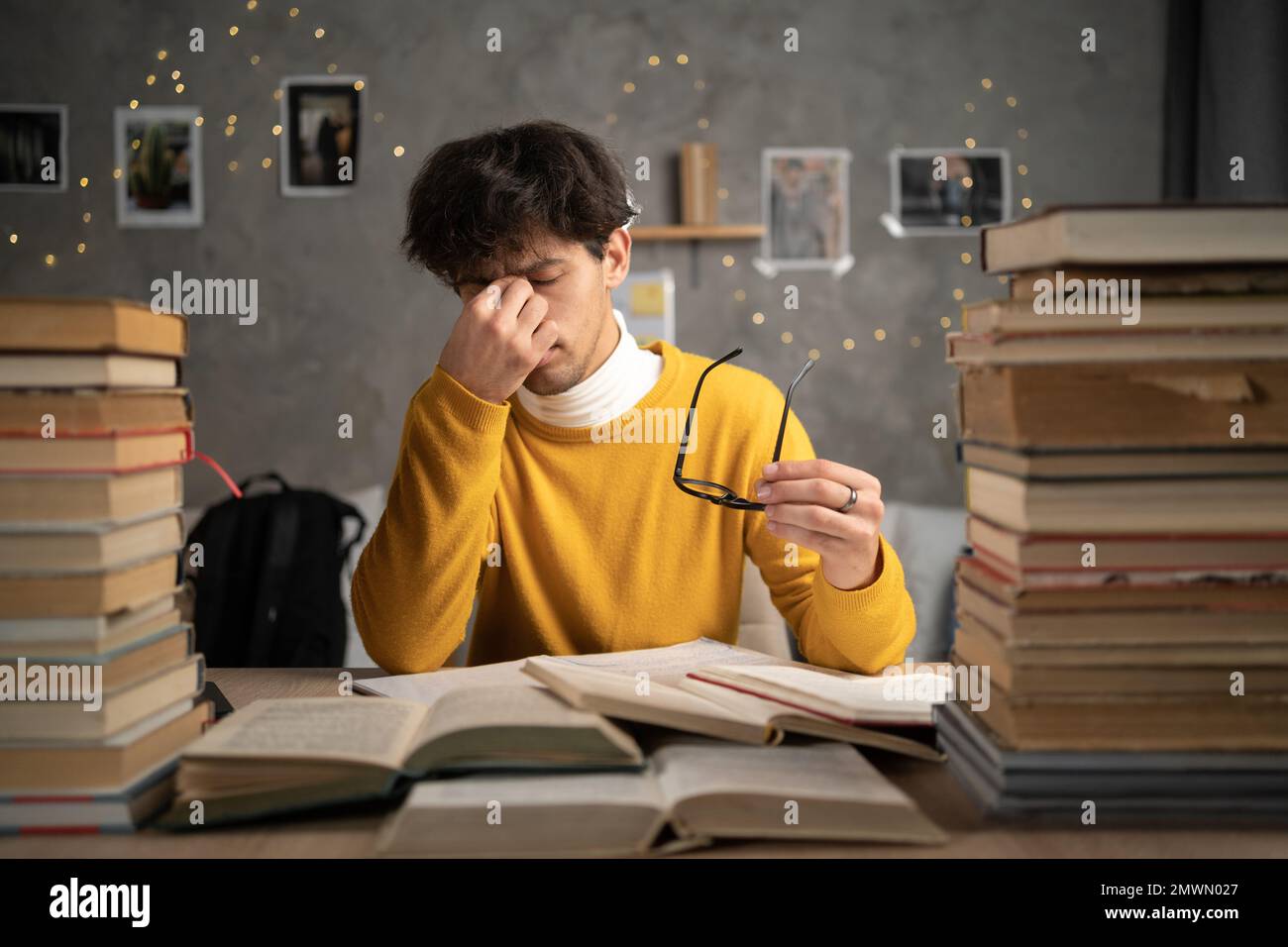 Tired exhausted guy student study hi-res stock photography and images ...