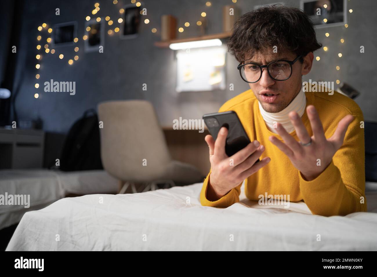Sad teenager reading text message hi-res stock photography and images ...