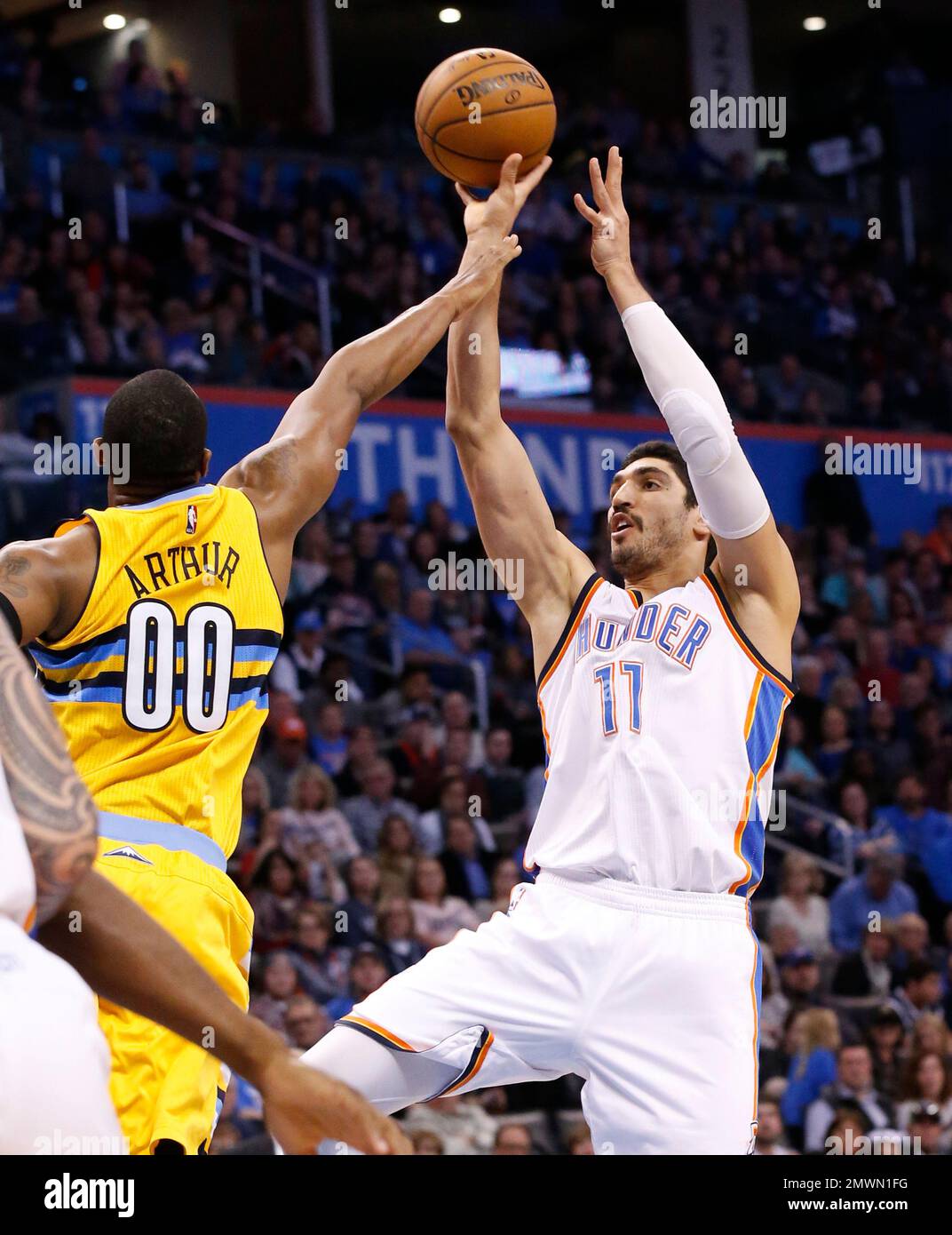 Oklahoma City Thunder center Enes Kanter (11) shoots over Denver ...