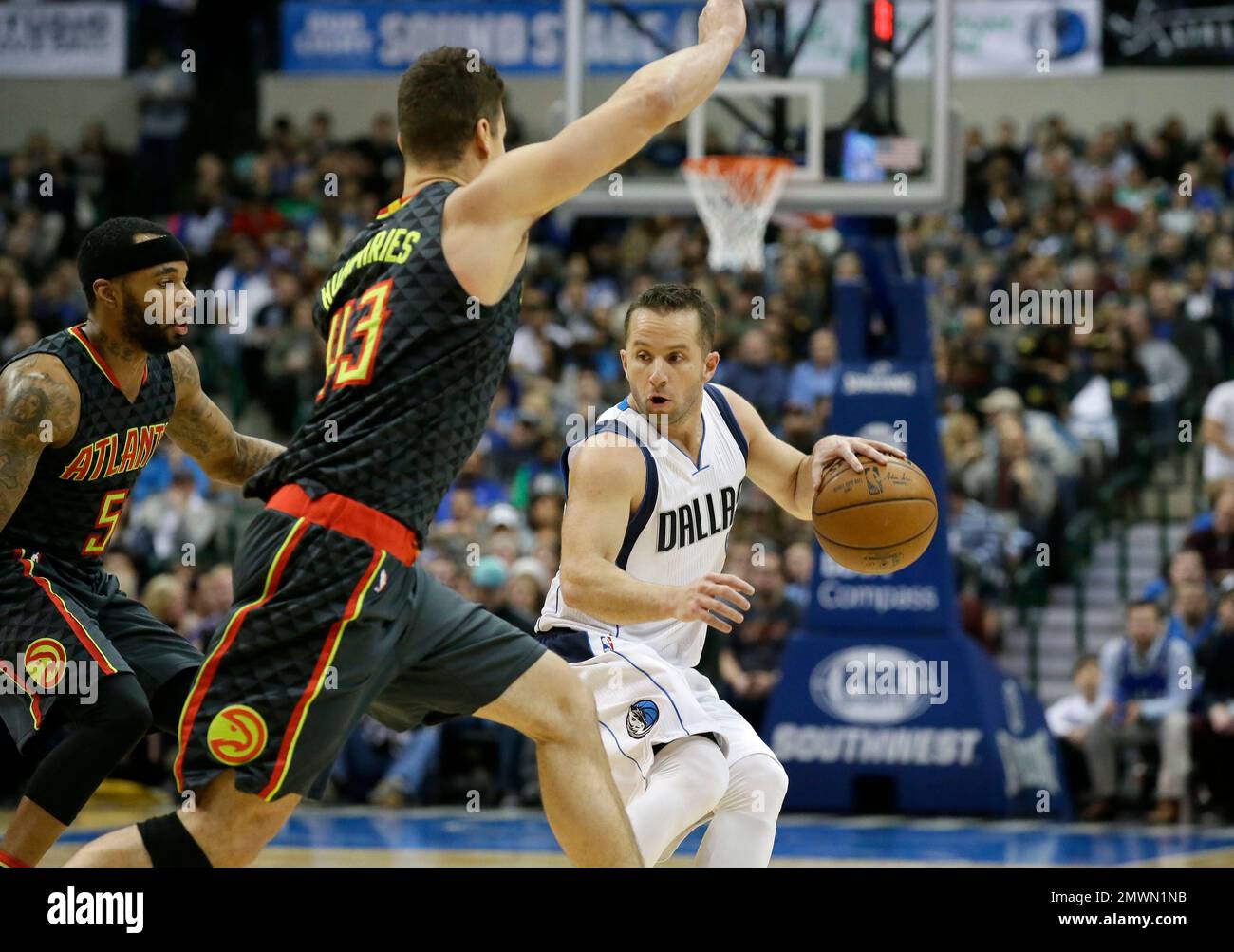 Dallas Mavericks guard J.J. Barea (5) dribbles against Atlanta Hawks ...
