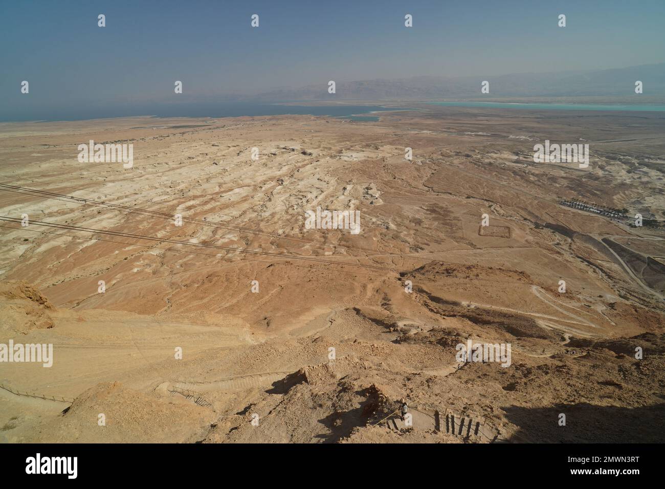 An aerial view of Masada with rocky ancient fortress and mountains in ...