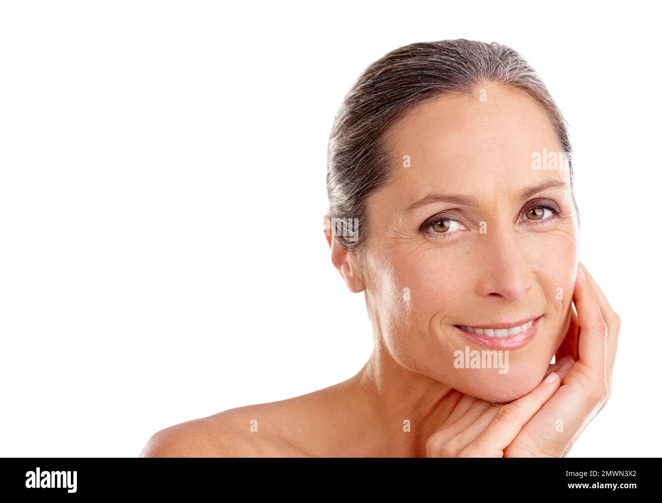 Still radiantly beautiful. Studio portrait of a beautiful mature woman ...