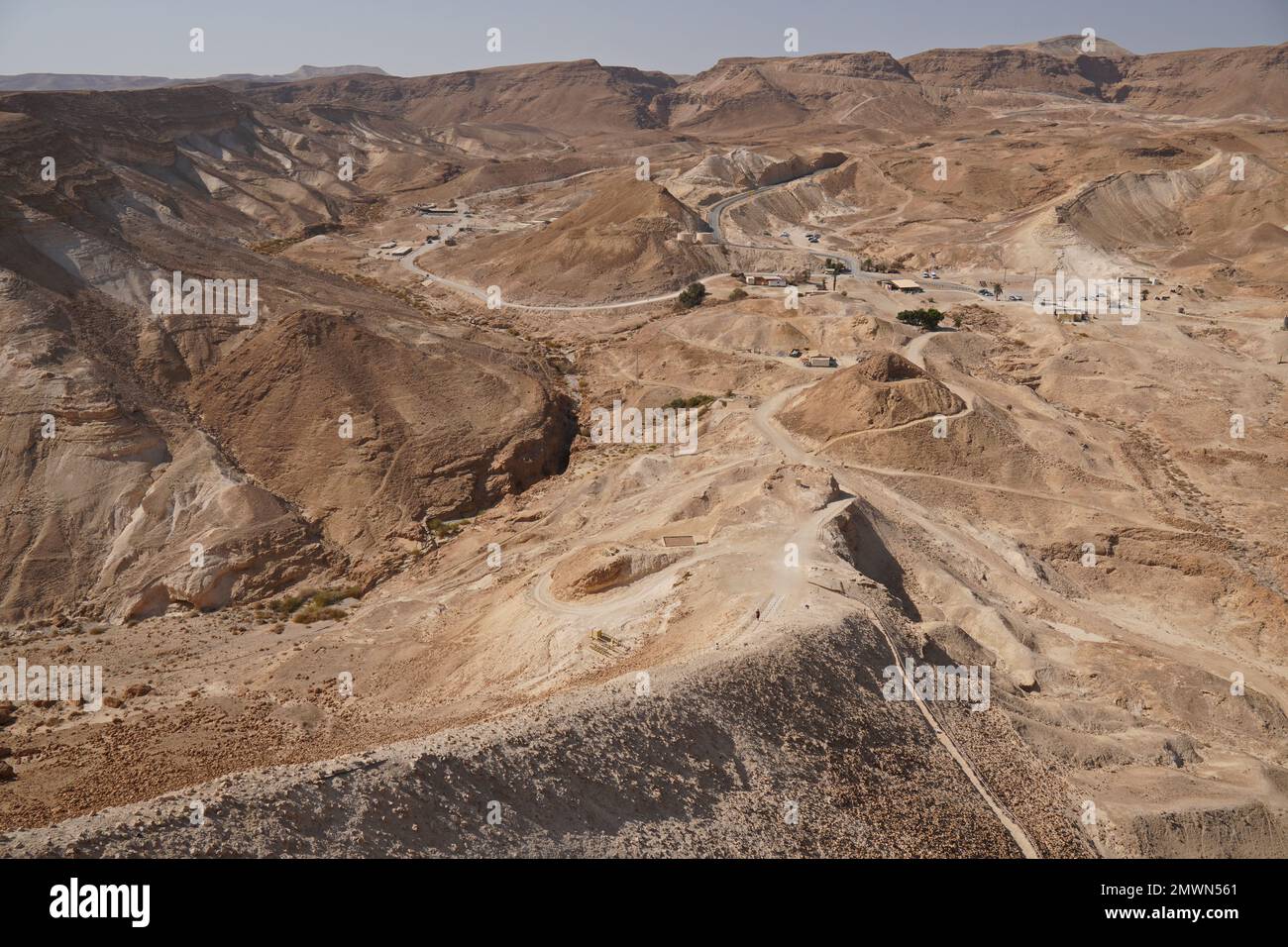 An aerial view of Masada with ancient fortress and rocky mountains in ...