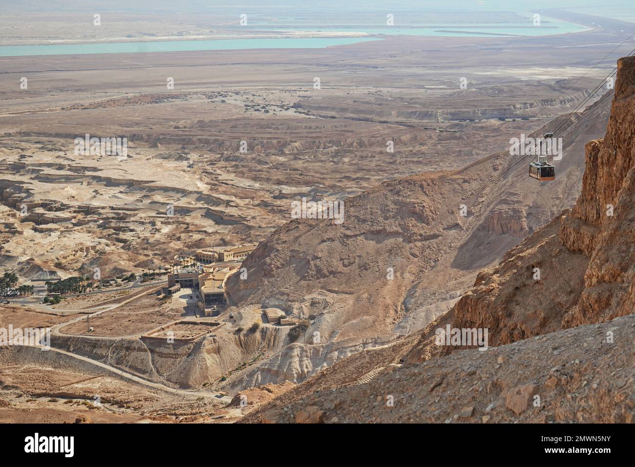 An aerial view of Masada with ancient fortress and rocky mountains in ...