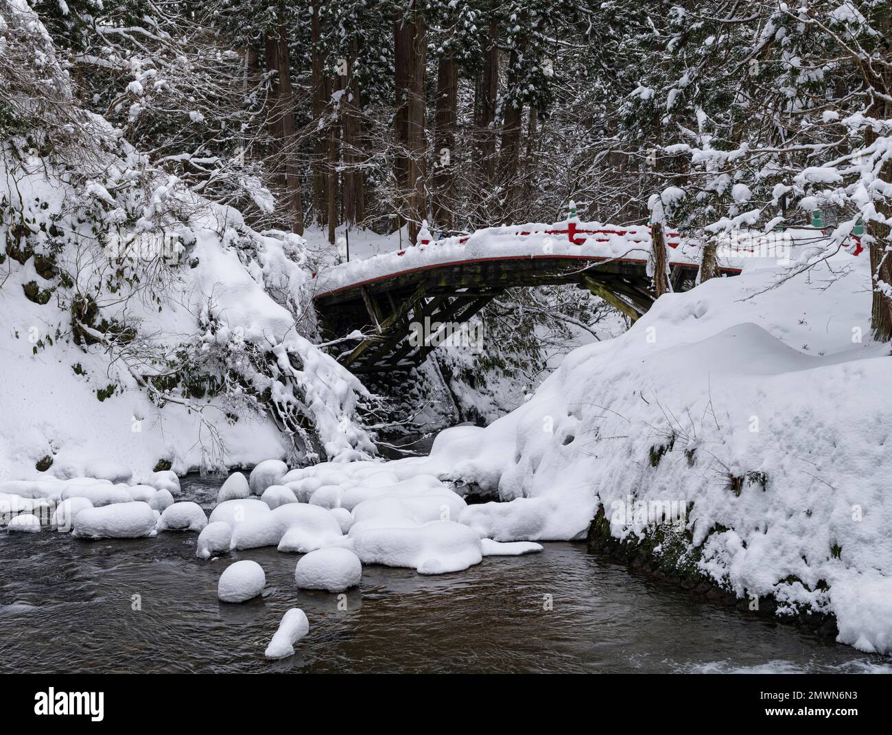The Harai River (Haraigawa) and Shinkyo Bridge with deep snow at the ...