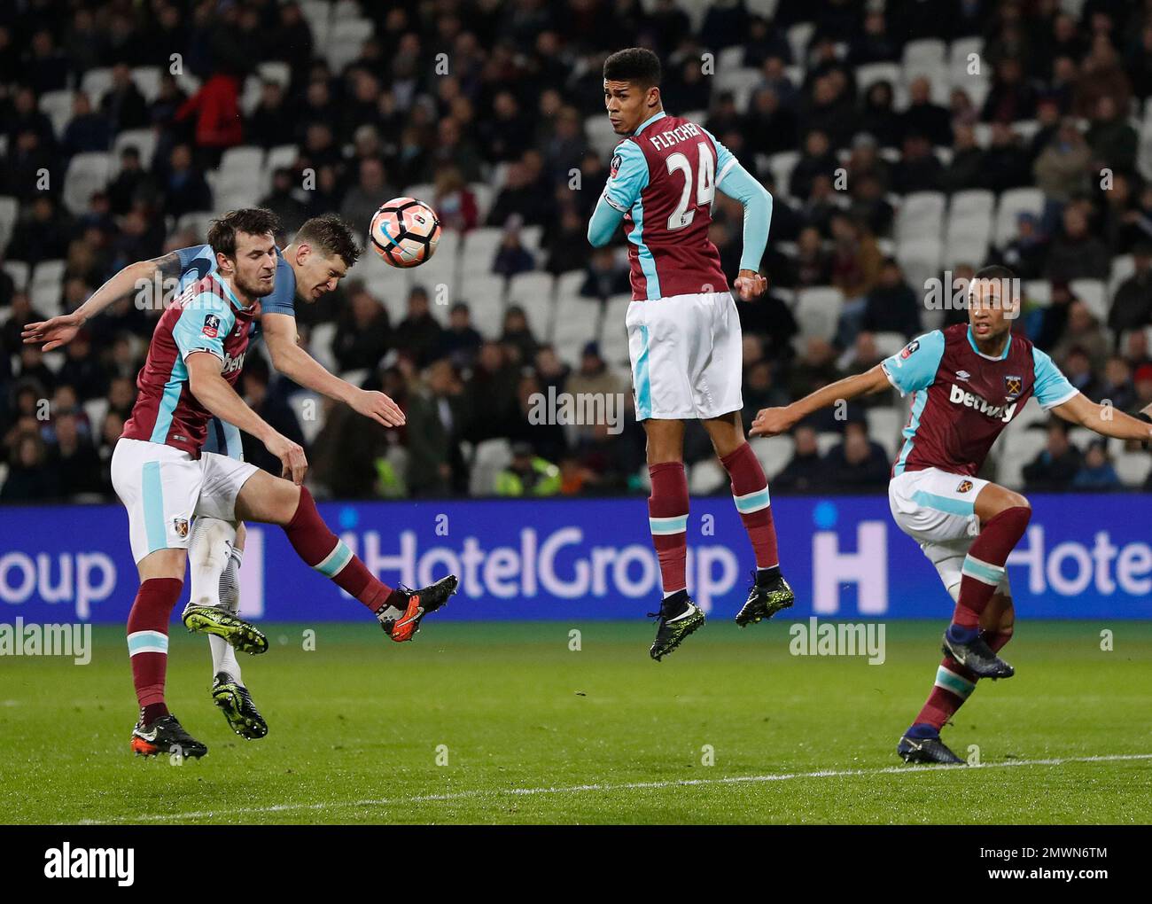 Manchester City's John Stones, second left, scores a goal during the FA ...