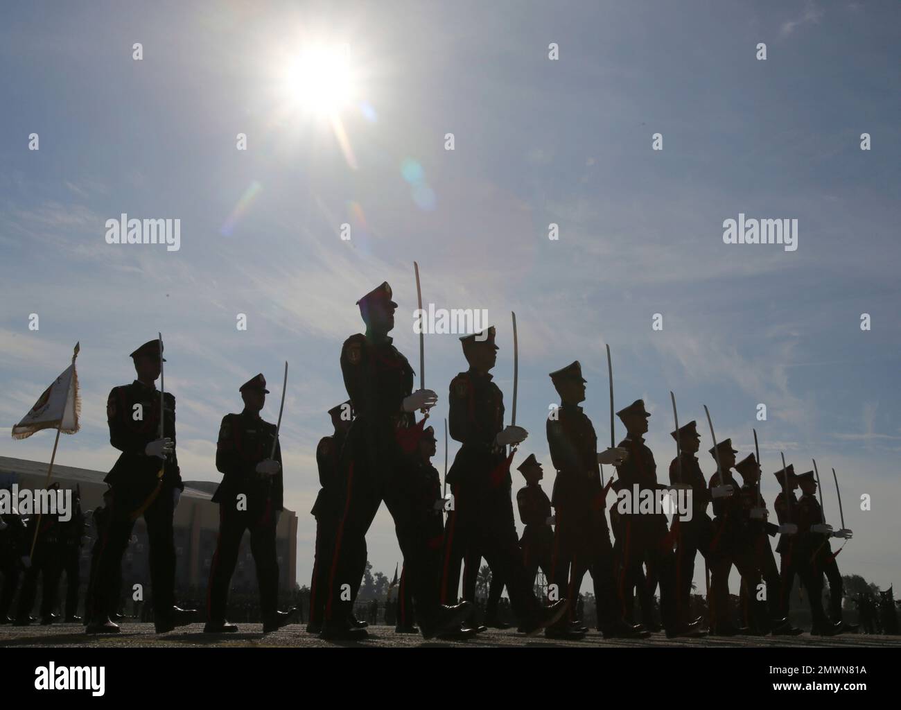 Iraqi army soldiers march during Iraqi Army Day celebrations in Baghdad ...