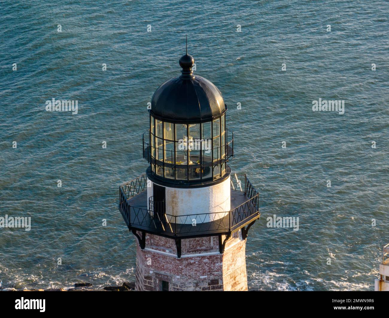 An aerial shot of the Montauk Point Lighthouse at the top, focusing on ...