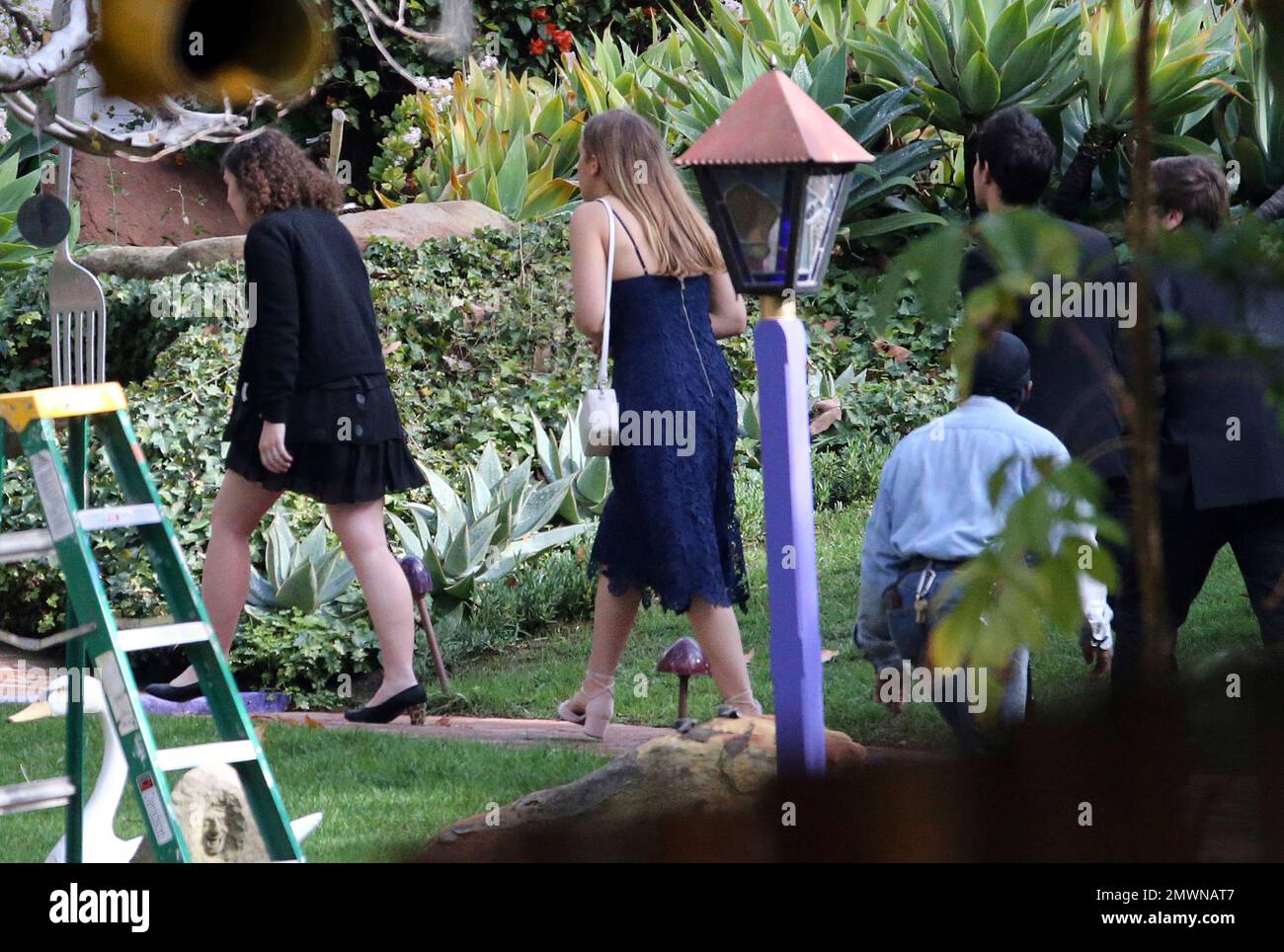 People arrive at a memorial service at the homes of Debbie Reynolds and ...