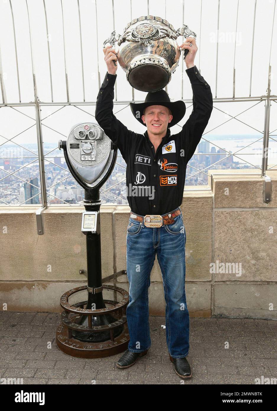 2016 Professional Bull Riders (PBR) World Champion Cooper Davis holds ...