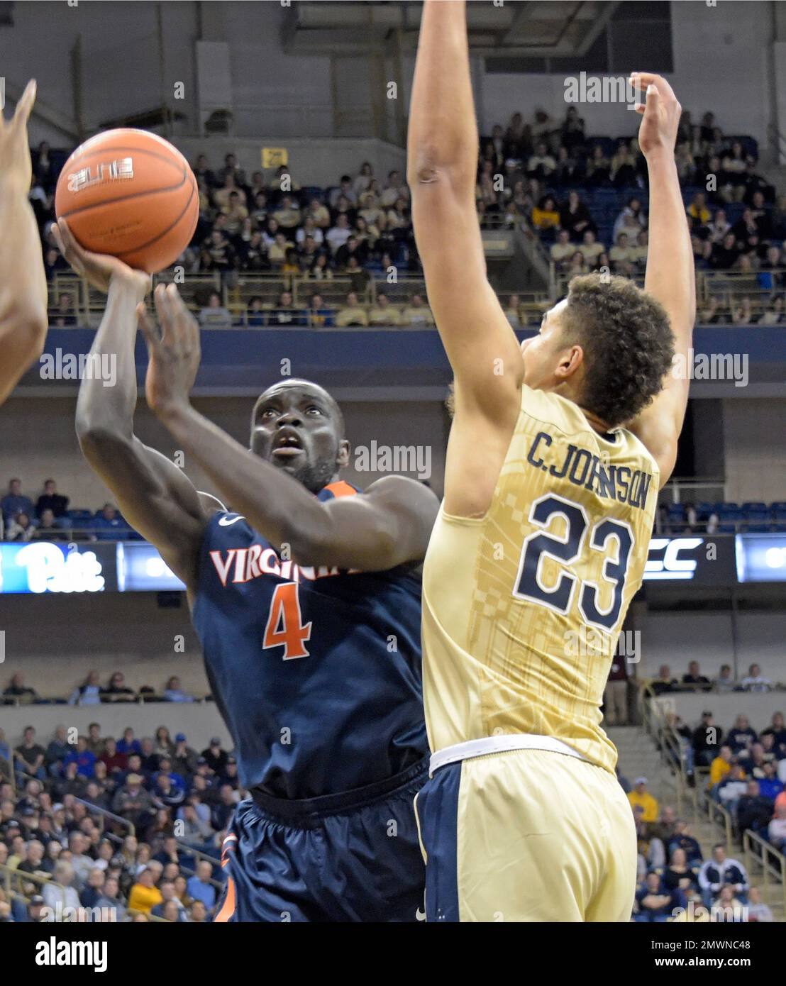 Virginia guard Marial Shayok (4) goes up for a shot against Pittsburgh ...
