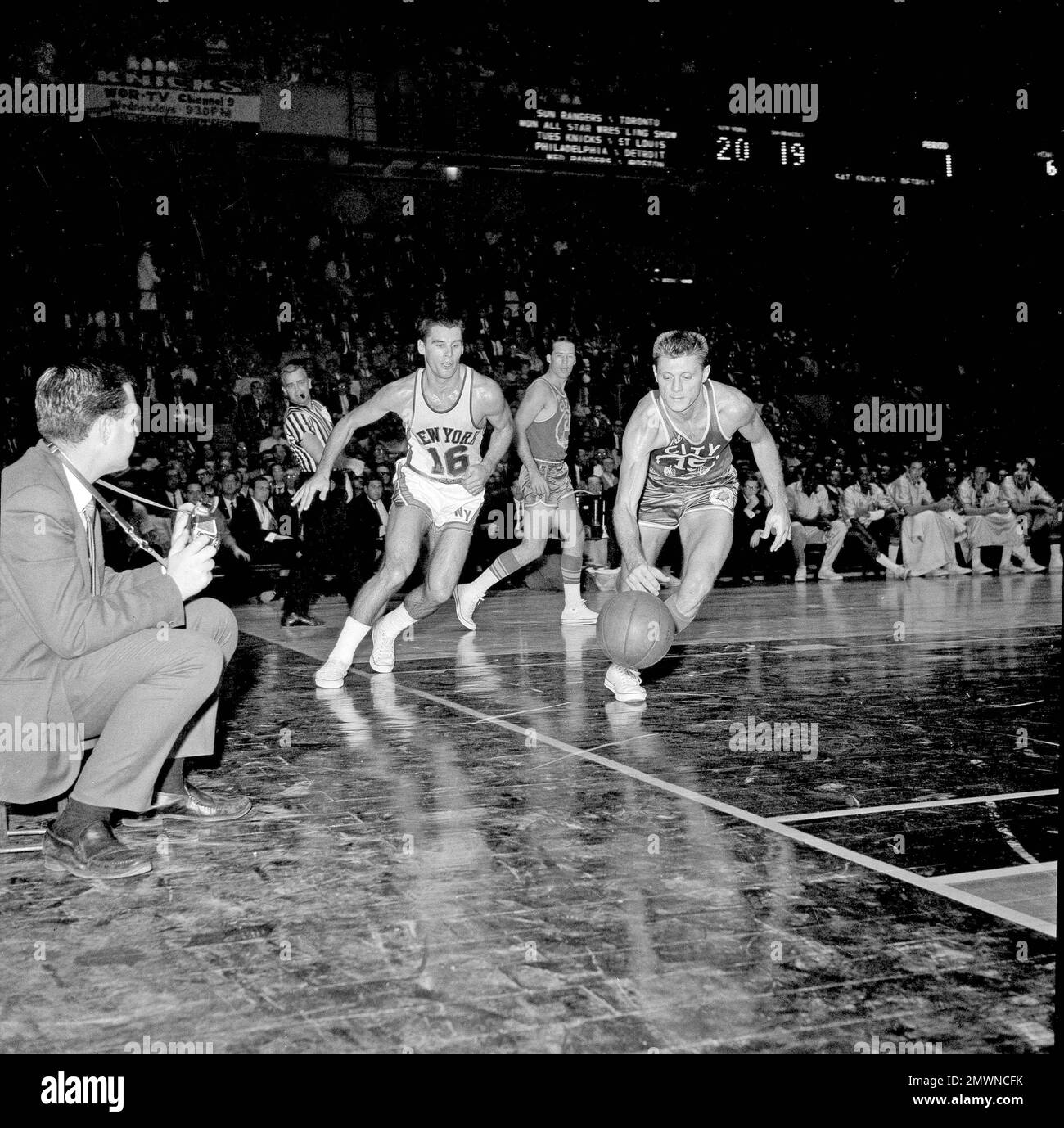 Guard Howard Komives (16) of the New York Knicks chases a loose ball ...