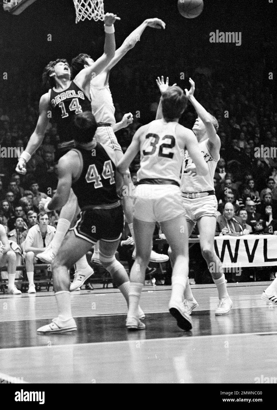 Ole Miss Rebels basketball star Johnny Neumann (14) goes up to score ...