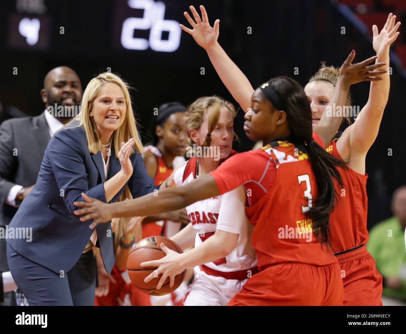Maryland coach Brenda Frese, left, follows from the sidelines as ...