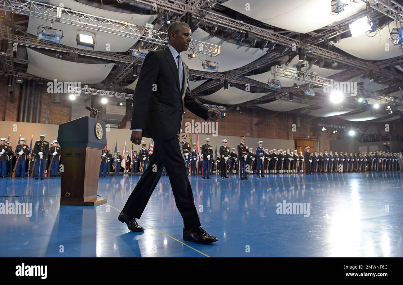President Barack Obama walks back to his seat after speaking during an ...