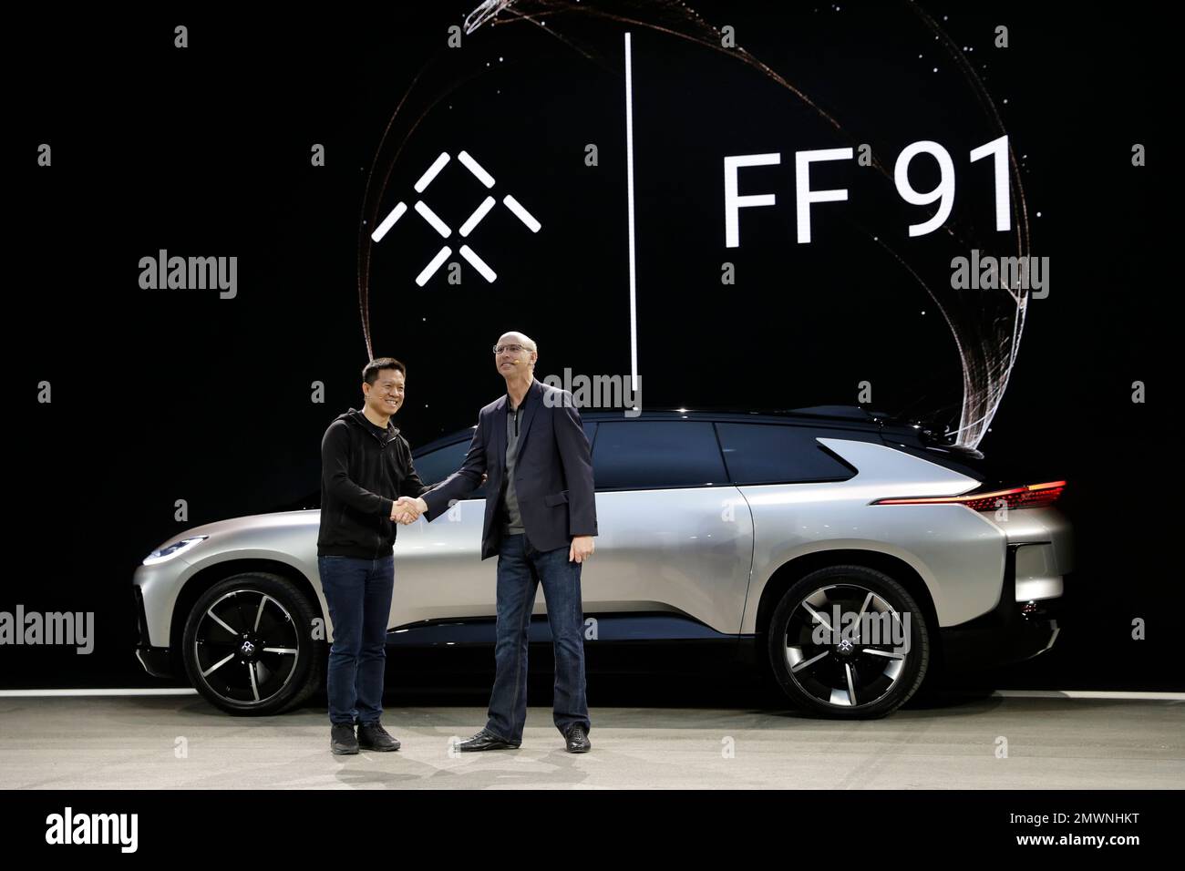 LeEco CEO Jia Yueting, left, and Nick Sampson, Faraday Future's senior vice president of product ...
