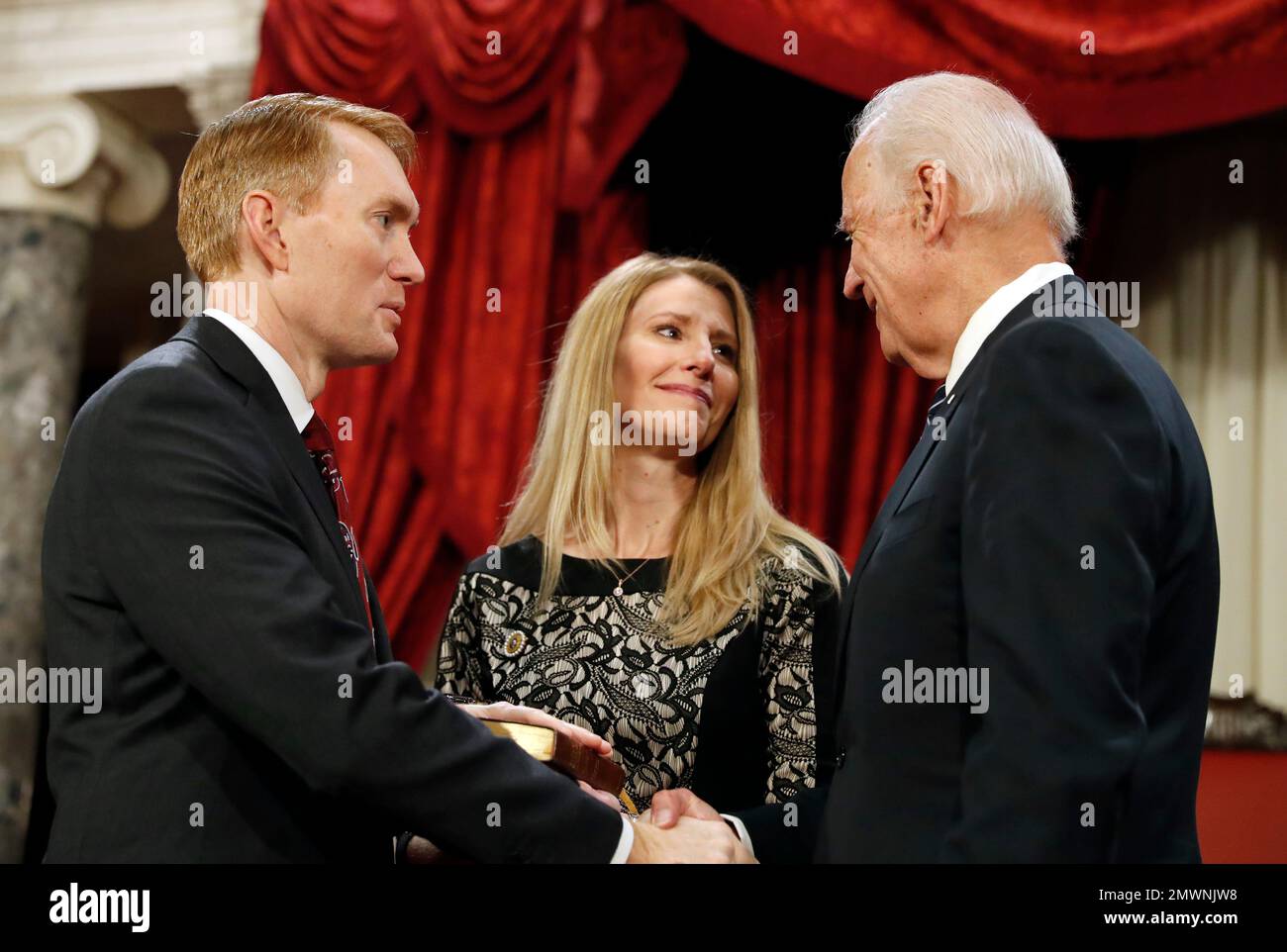 Vice President Joe Biden, right, shakes hands with Sen. James Lankford ...