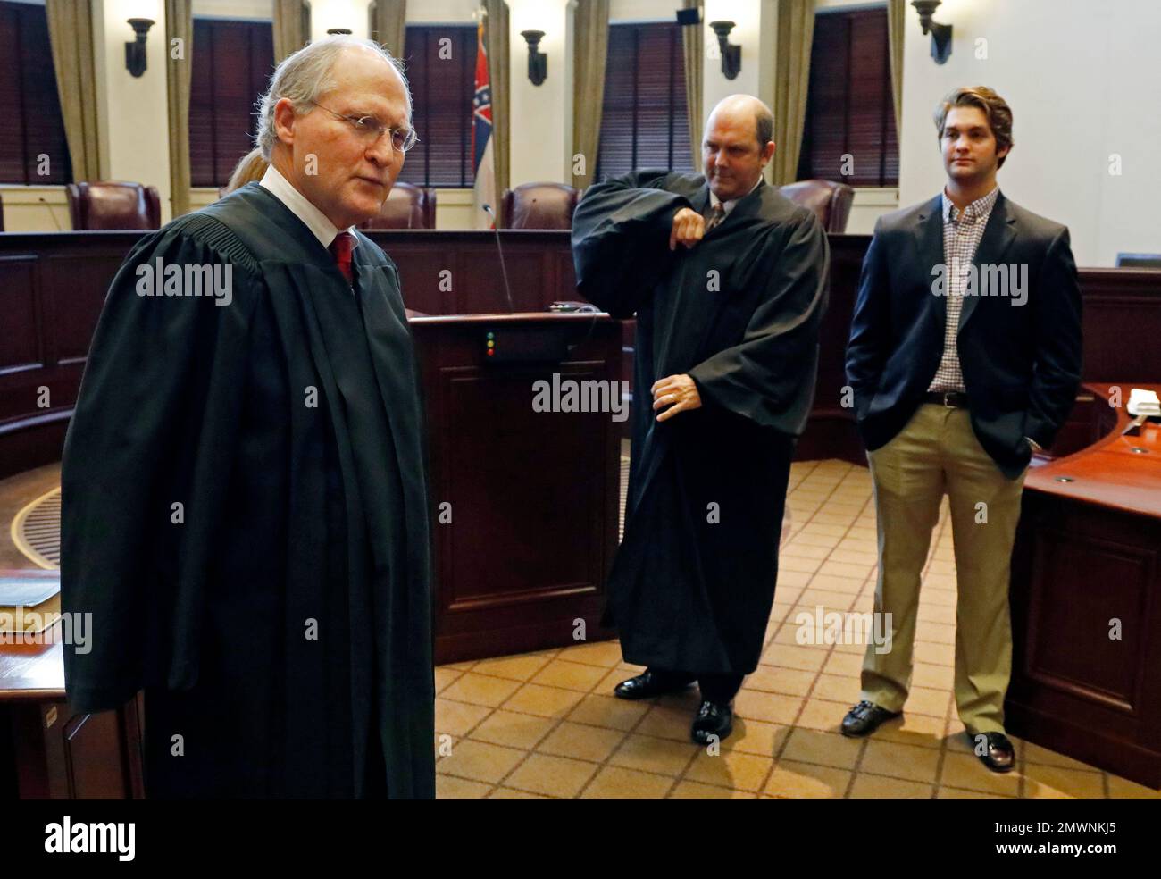 Mississippi Supreme Court Chief Justice William Waller Jr., left ...