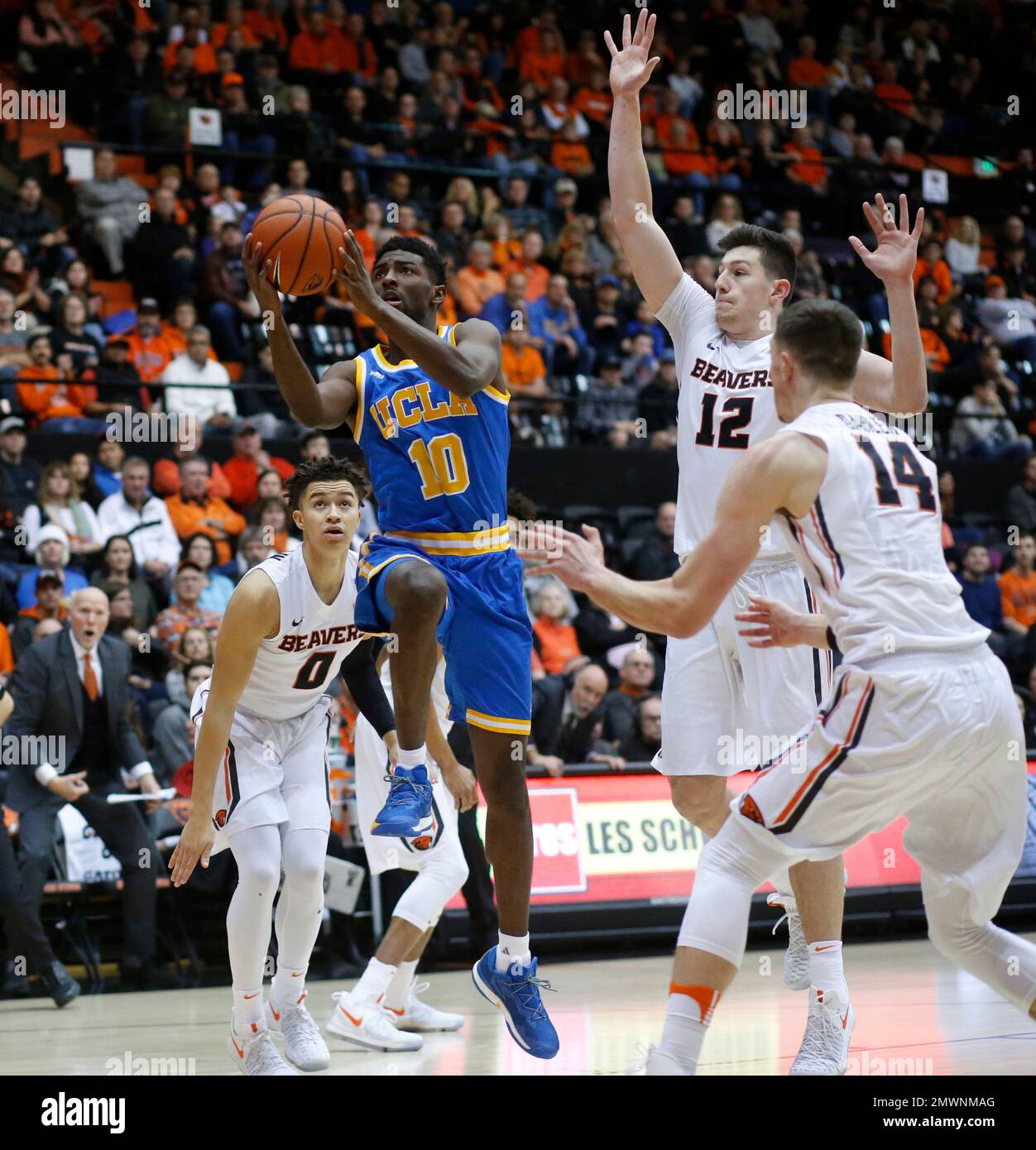 UCLA's Isaac Hamilton (10) and Oregon State's JaQouri McLaughlin (0 ...