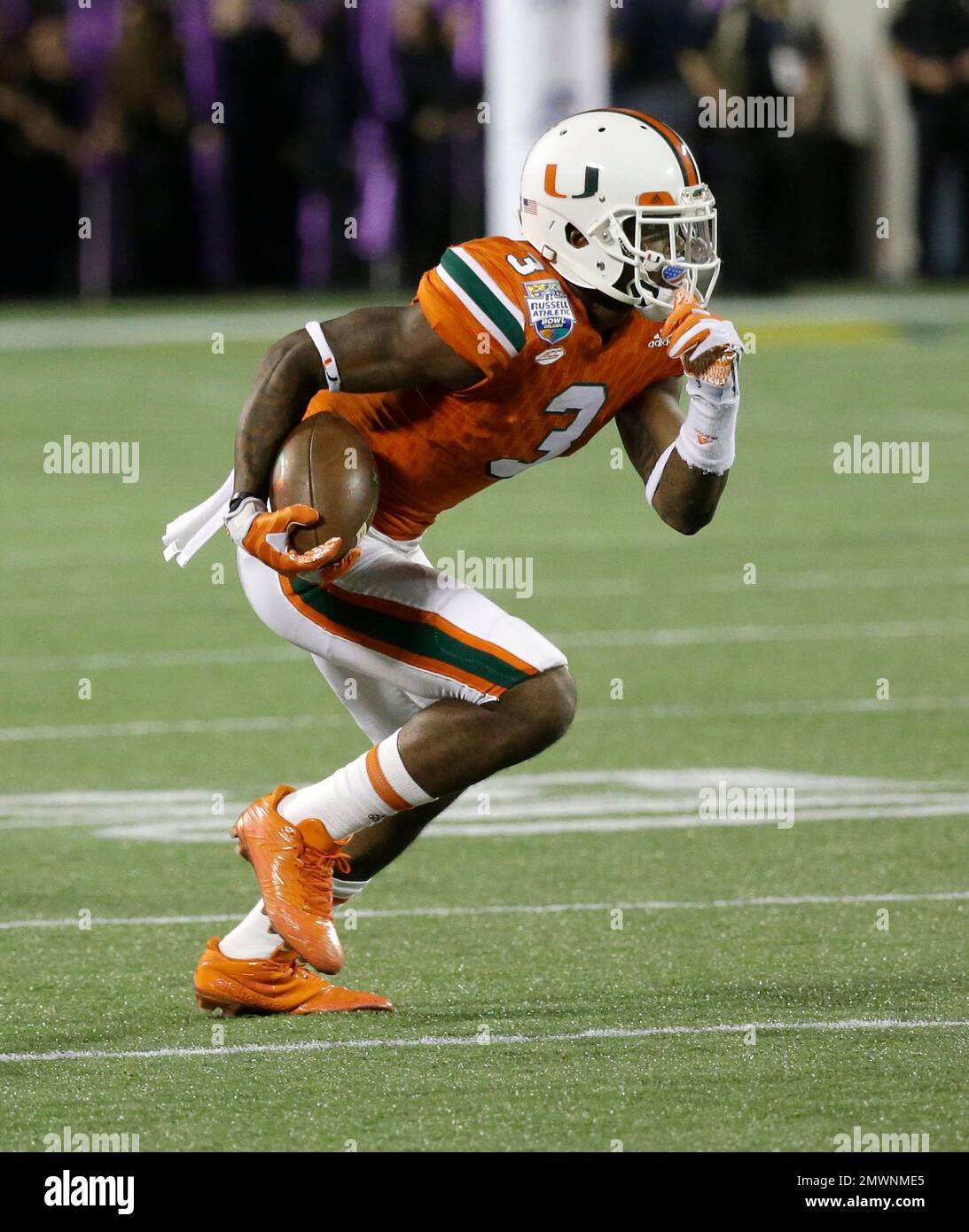 Miami wide receiver Stacy Coley (3) runs against West Virginia after a ...