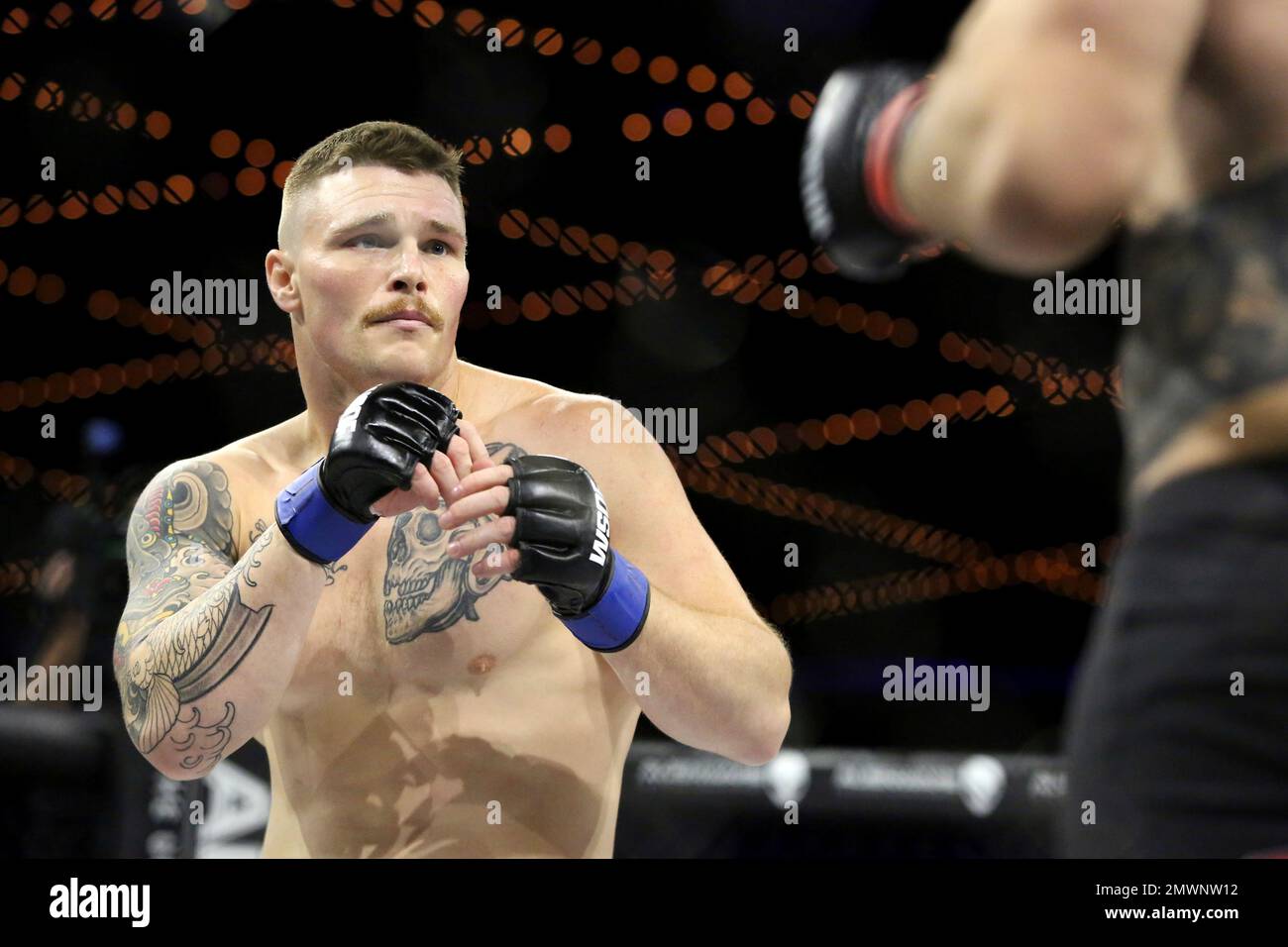 Jake Heun in action against Smealinho Rama during their light ...