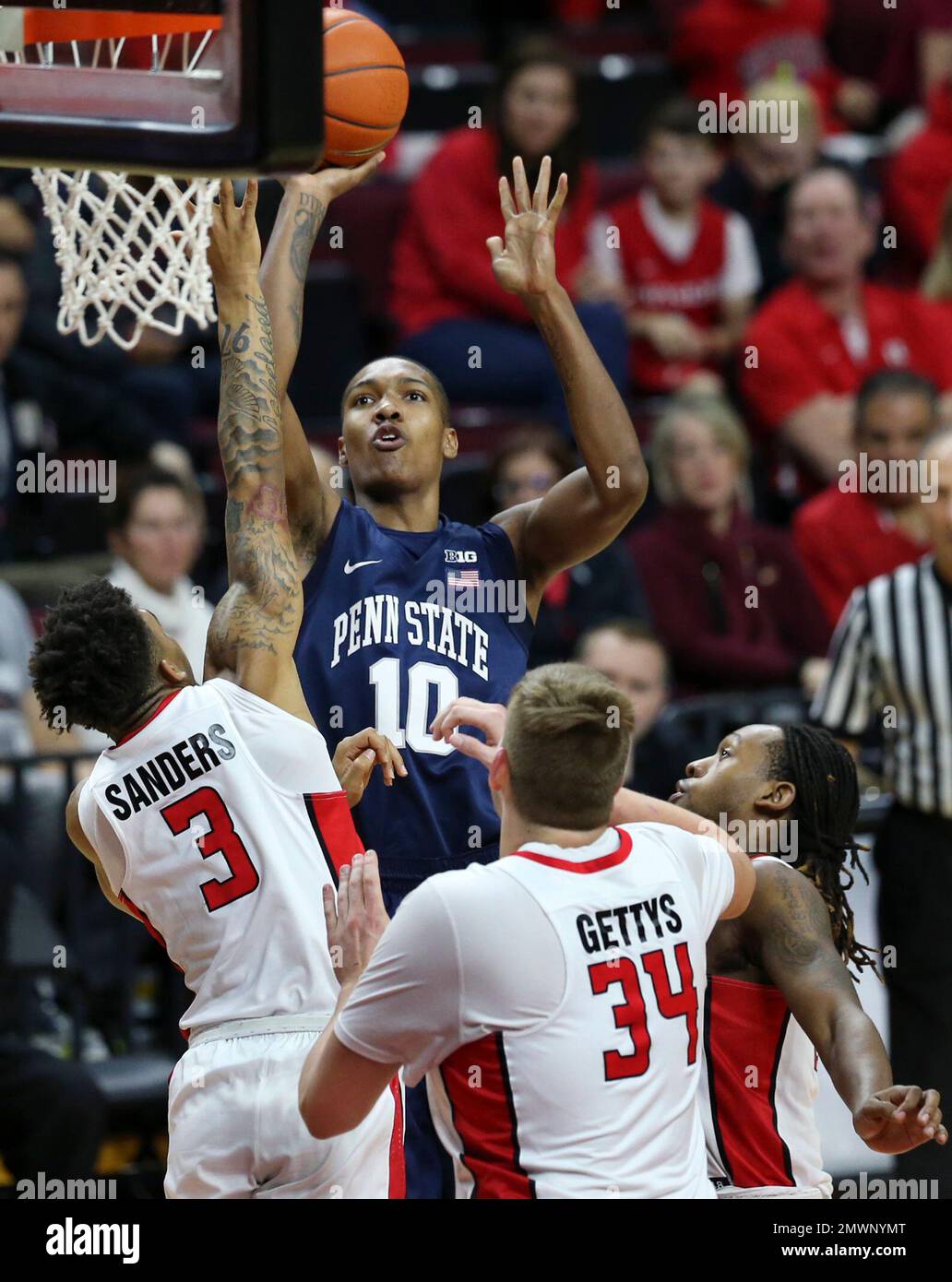 Penn State forward Tony Carr (10) shoots past Rutgers center C.J ...