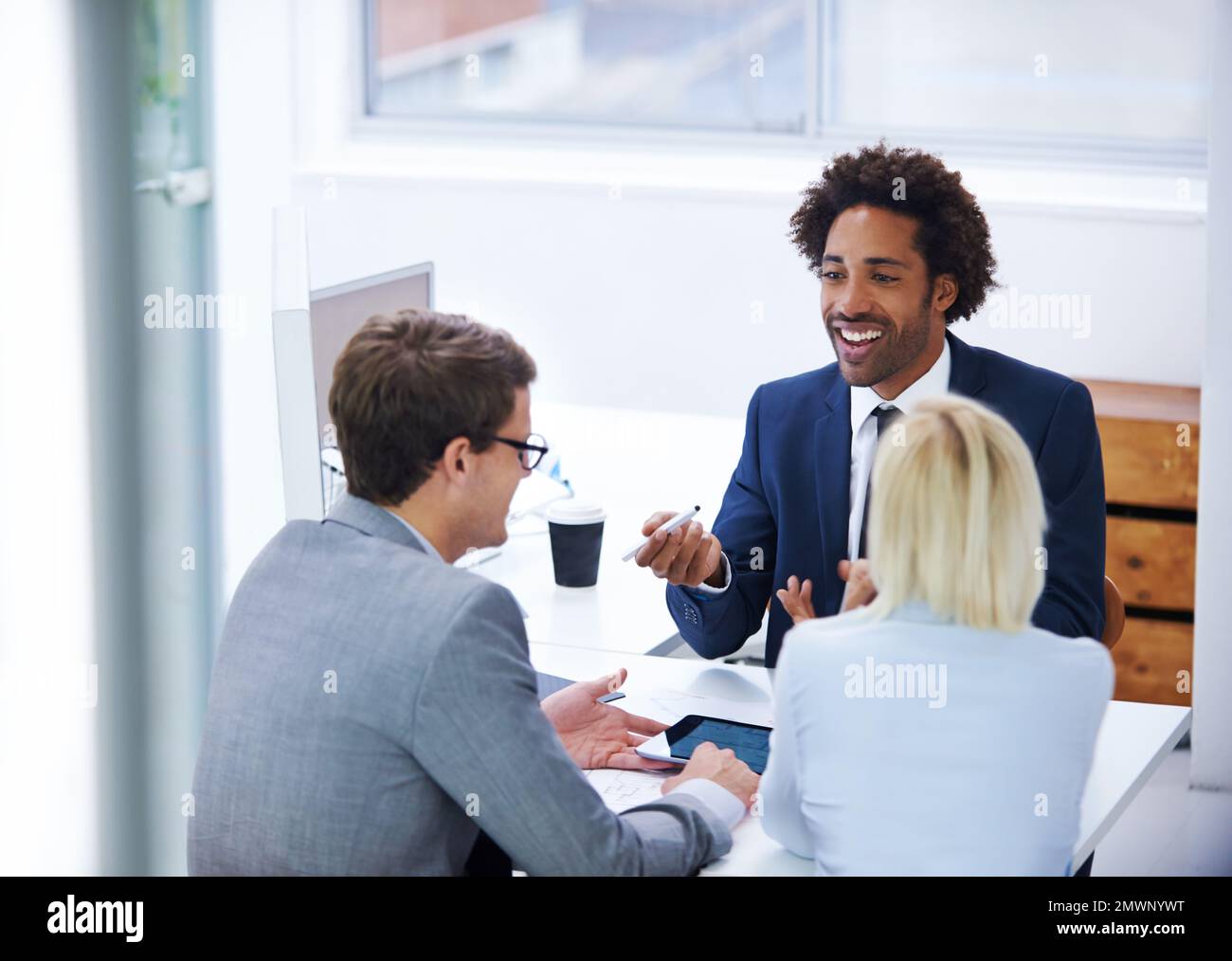 Developing positive work dynamics. a businessman having a positive ...