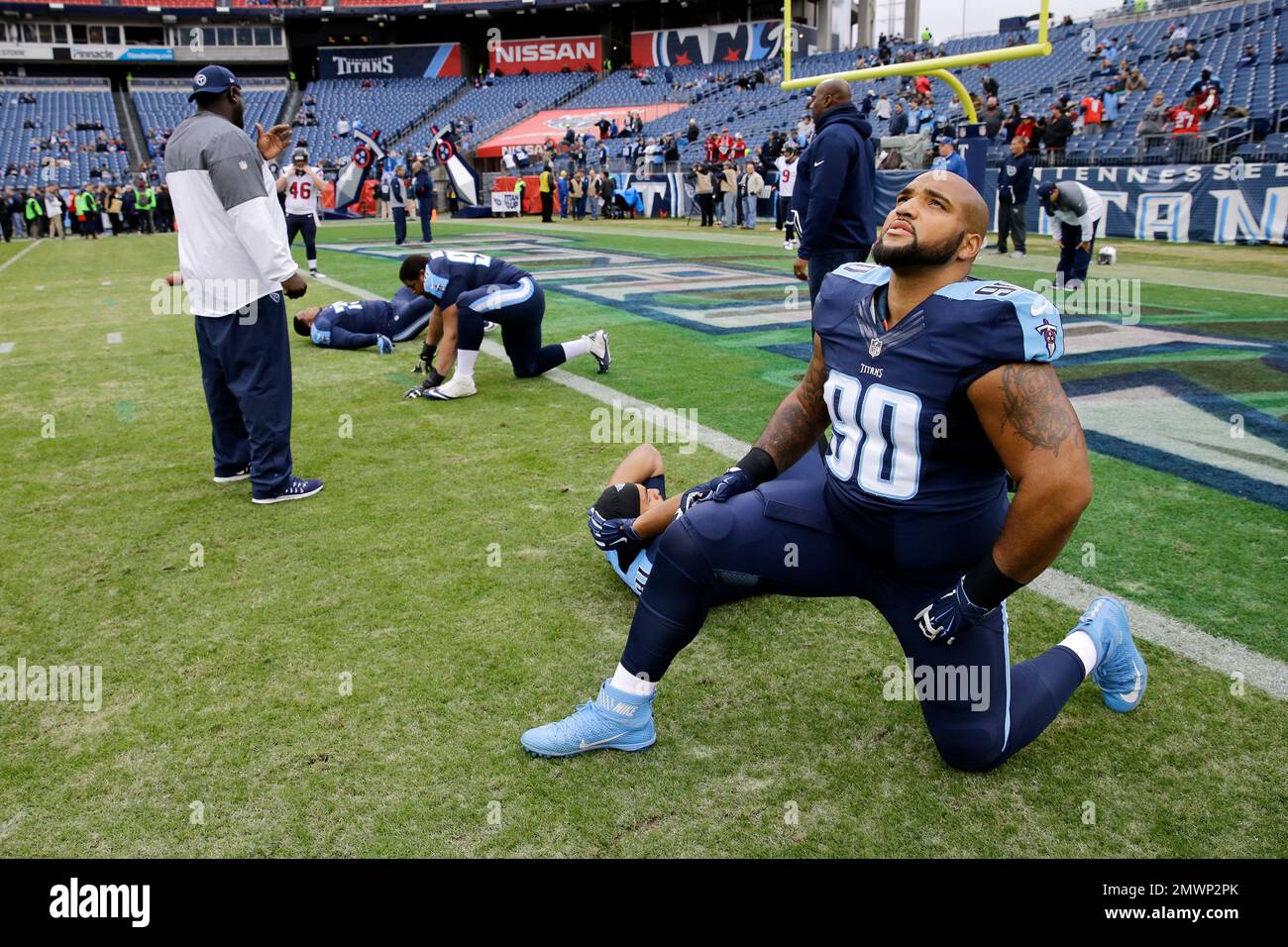Tennessee Titans defensive lineman DaQuan Jones (90) stretches before an NFL football game ...