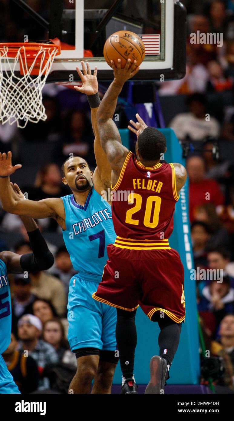 Cleveland Cavaliers guard Kay Felder (20) shoots over Charlotte Hornets ...