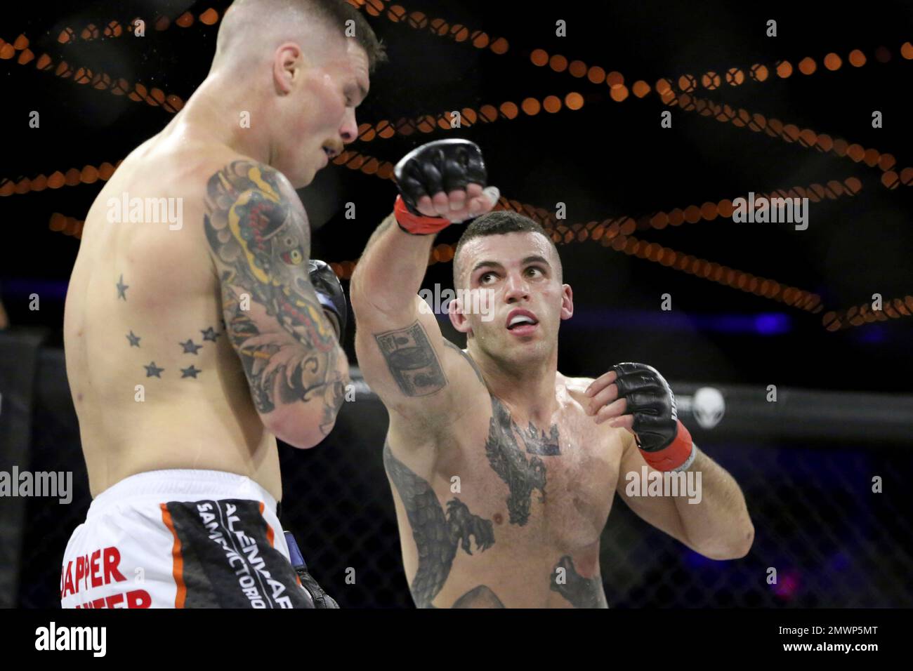 Smealinho Rama, right, in action against Jake Heun during their light ...