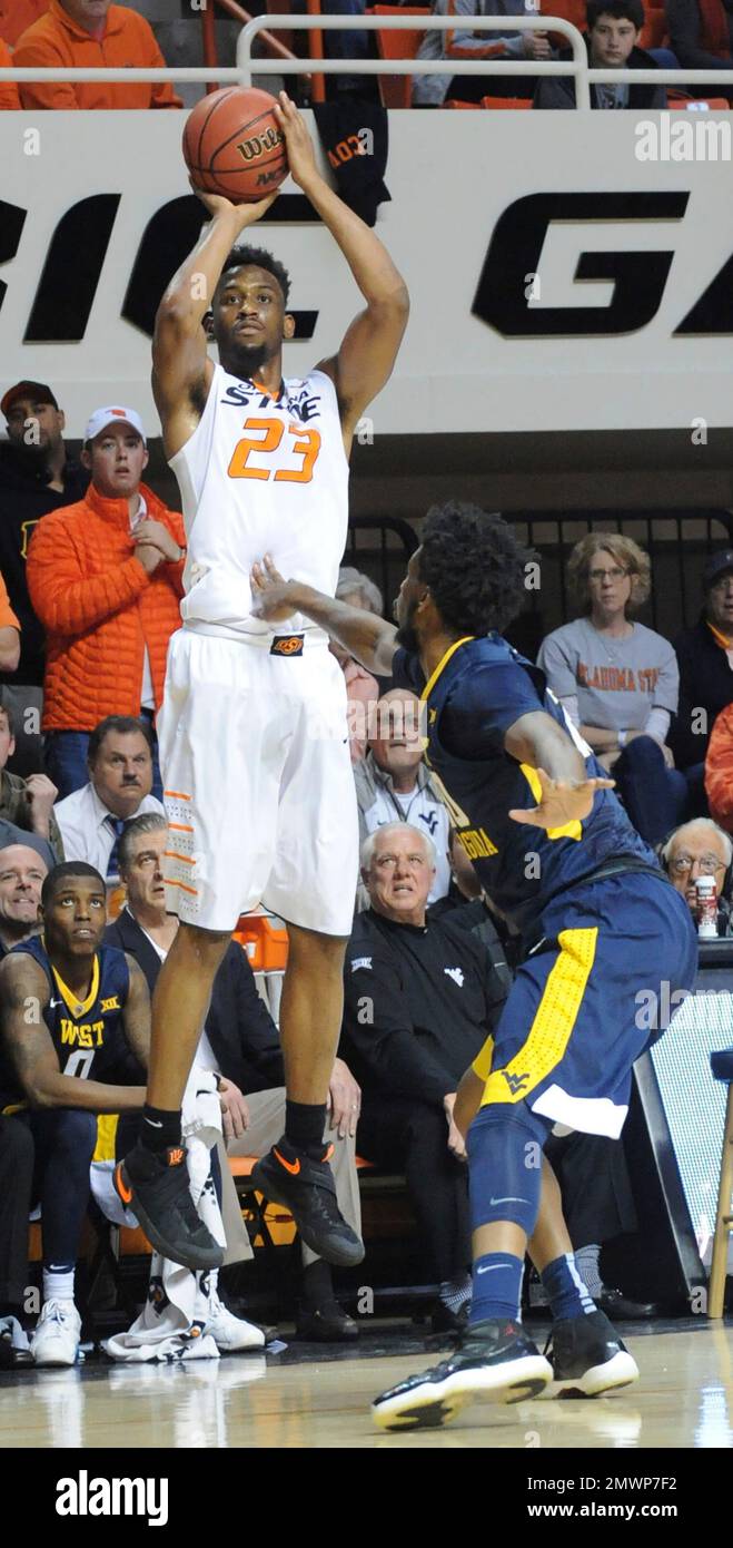 Oklahoma State forward Leyton Hammonds (23) shoots over West Virginia ...