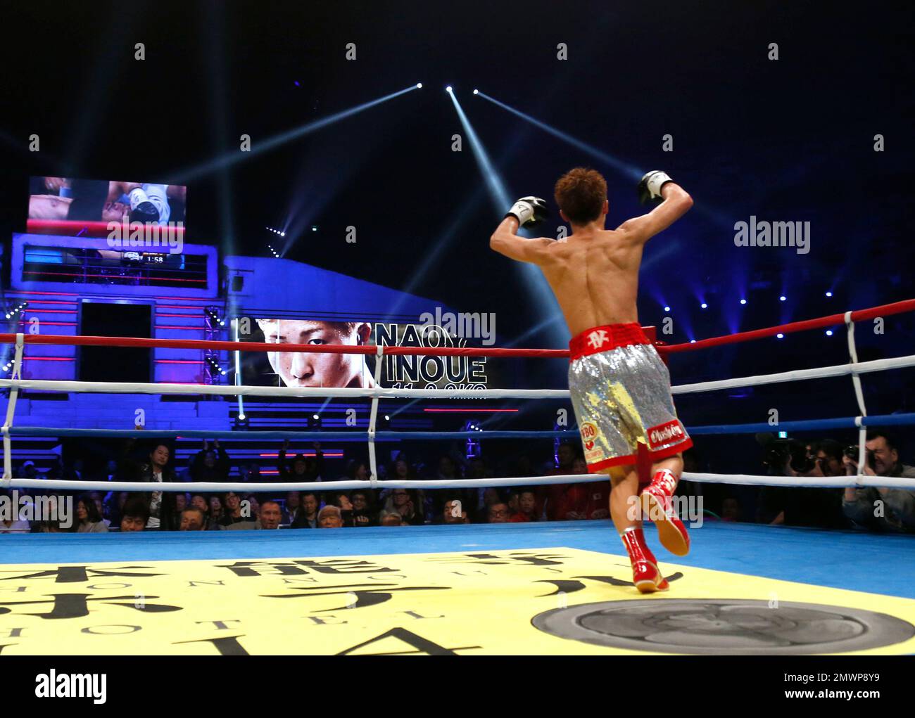 Japanese champion Naoya Inoue celebrates after beating his compatriot ...