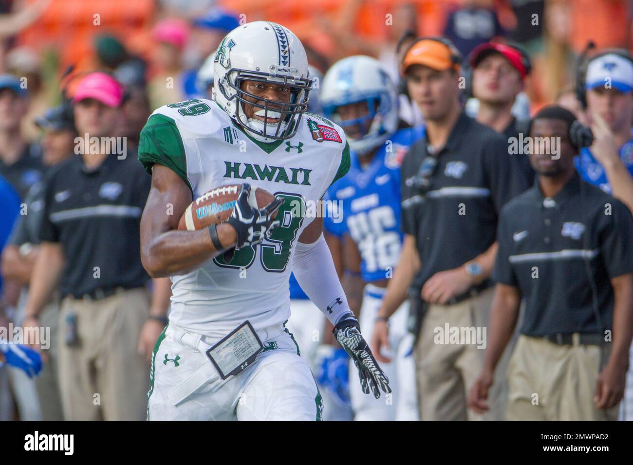 Hawaii defensive back Trayvon Henderson (39) runs an interception back ...