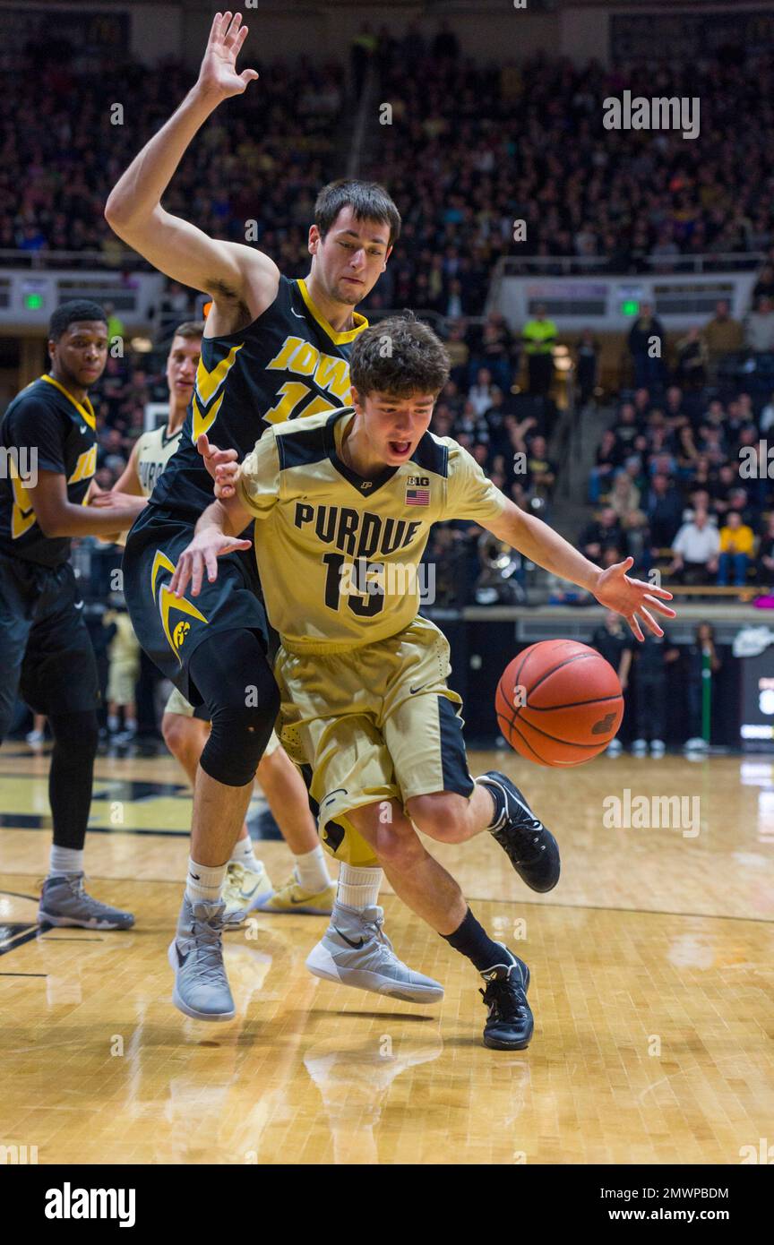 Purdue guard Tommy Luce (15) drives the ball into the Iowa defense in ...