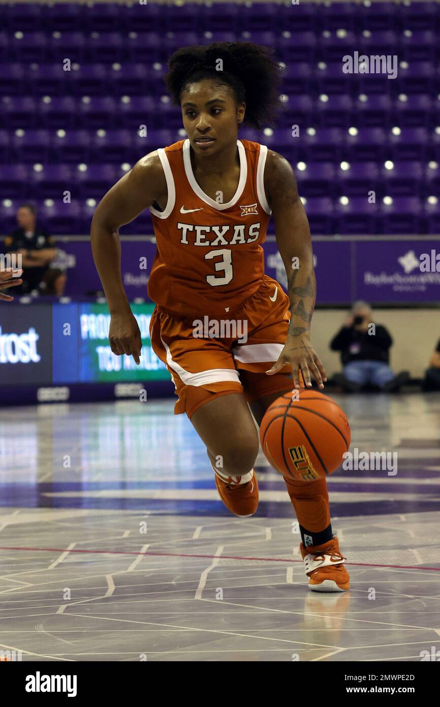 Texas guard Rori Harmon (3) moves the ball down the court against TCU ...