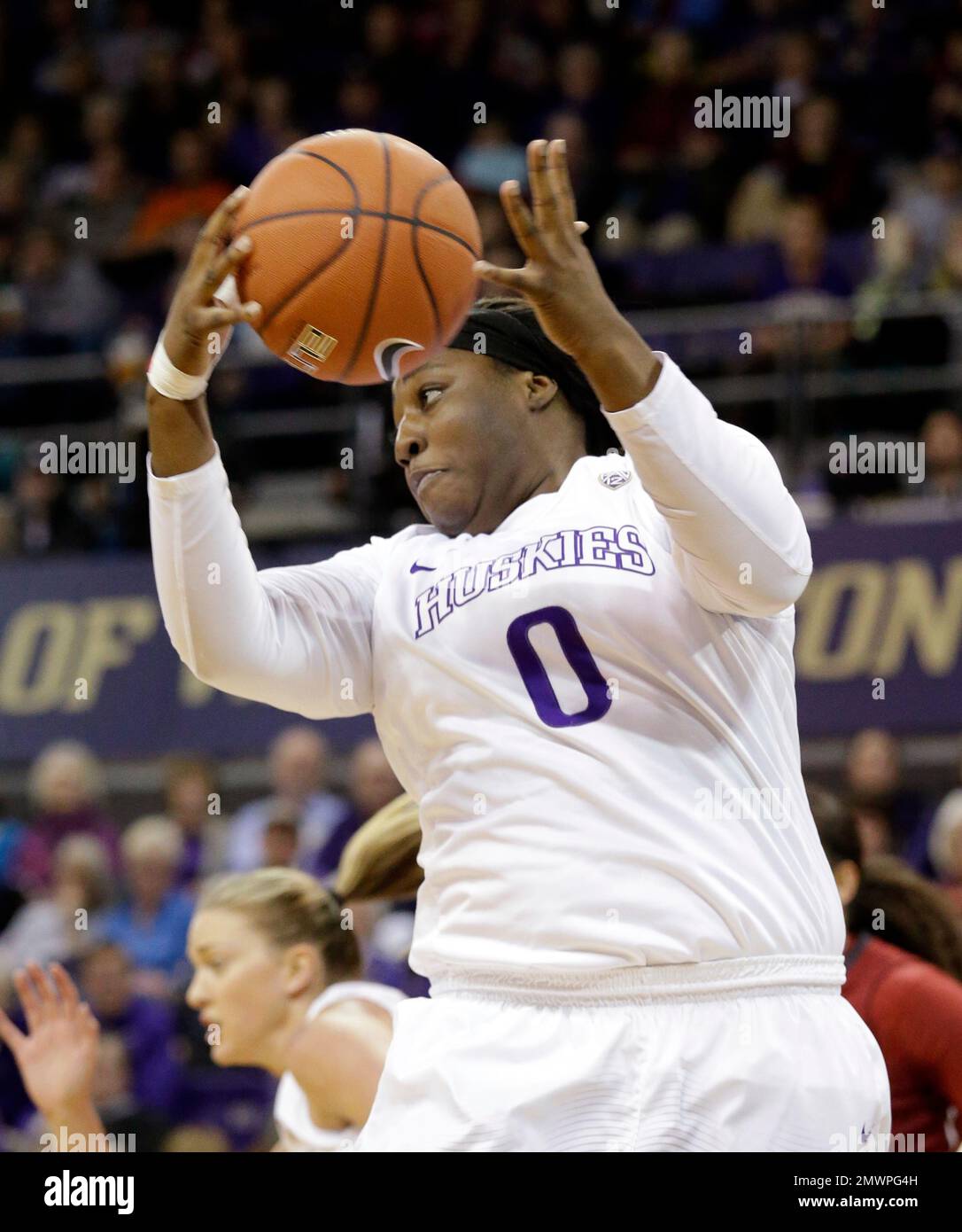 Washington's Chantel Osahor grabs a rebound against Washington State in ...