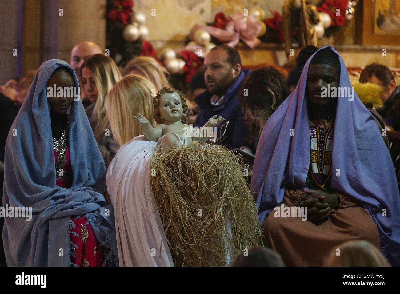 Catholic christians reenacting the Nativity scene during a Christmas ...