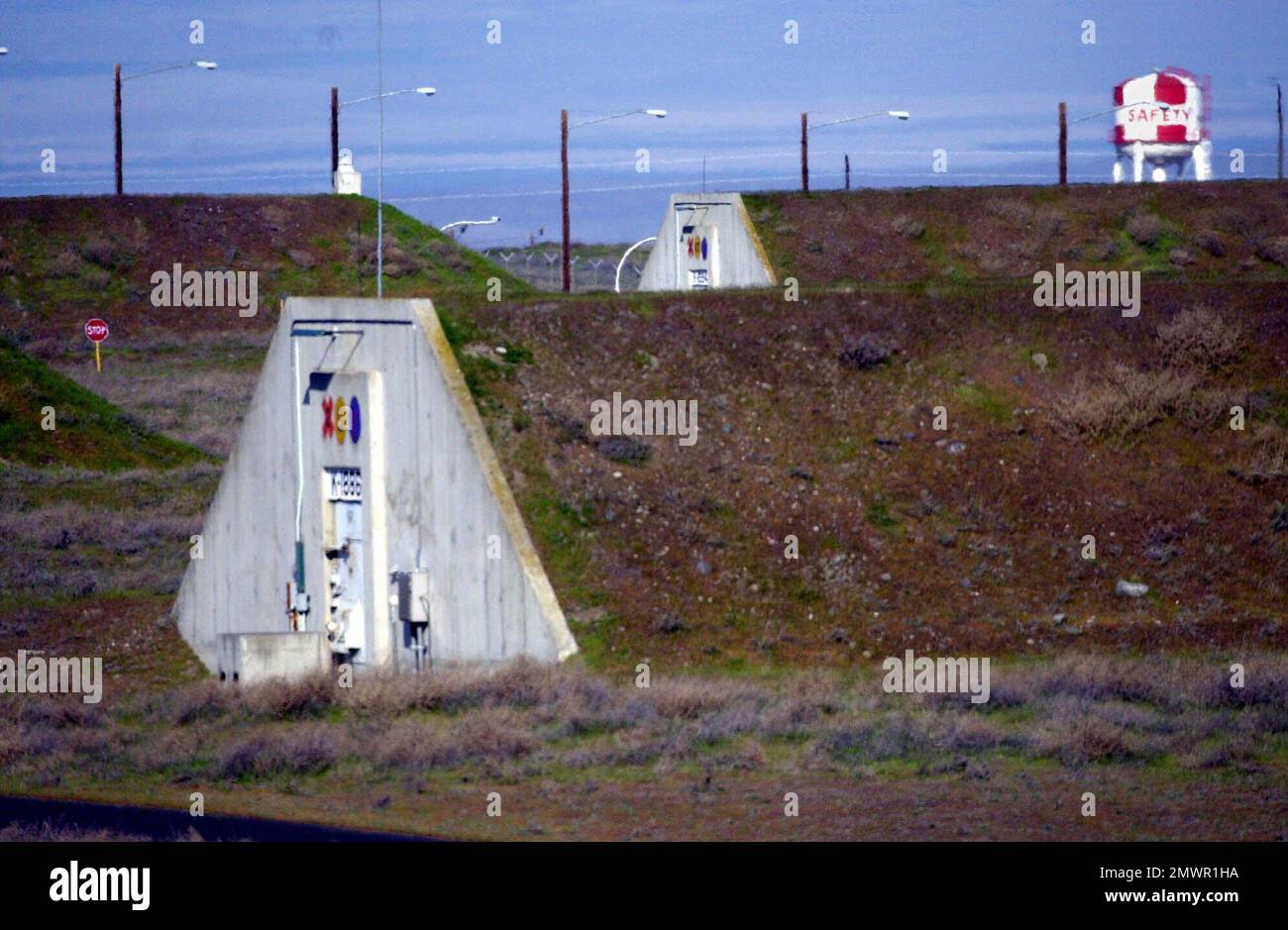 FILE - In this April 5, 2000, file photo, earth-covered bunkers housing ...