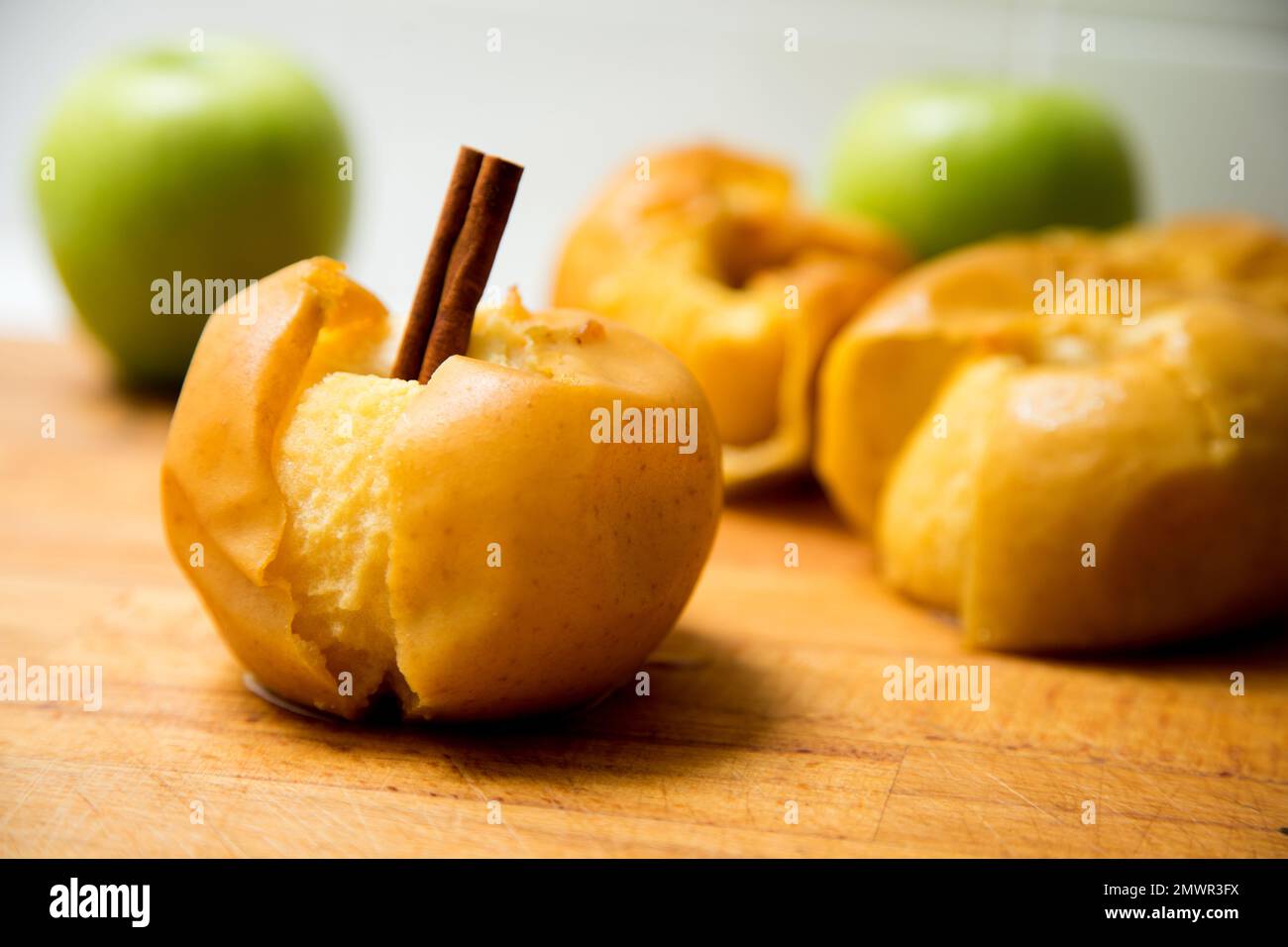 Apple baked in the oven with cinnamon aroma Stock Photo - Alamy