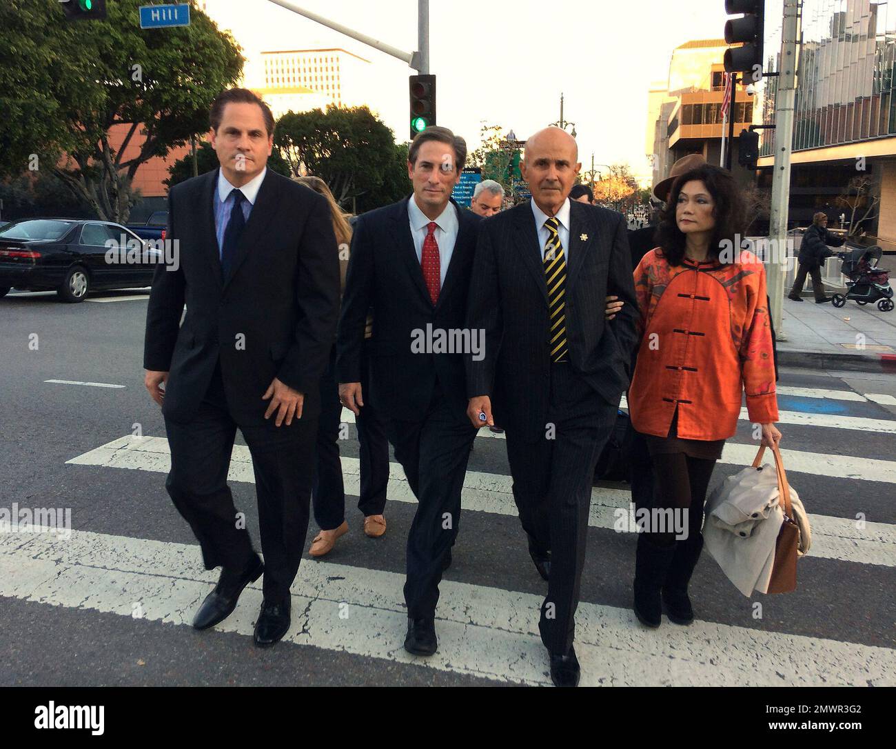 Former Los Angeles County Sheriff Lee Baca, third from left, with his ...