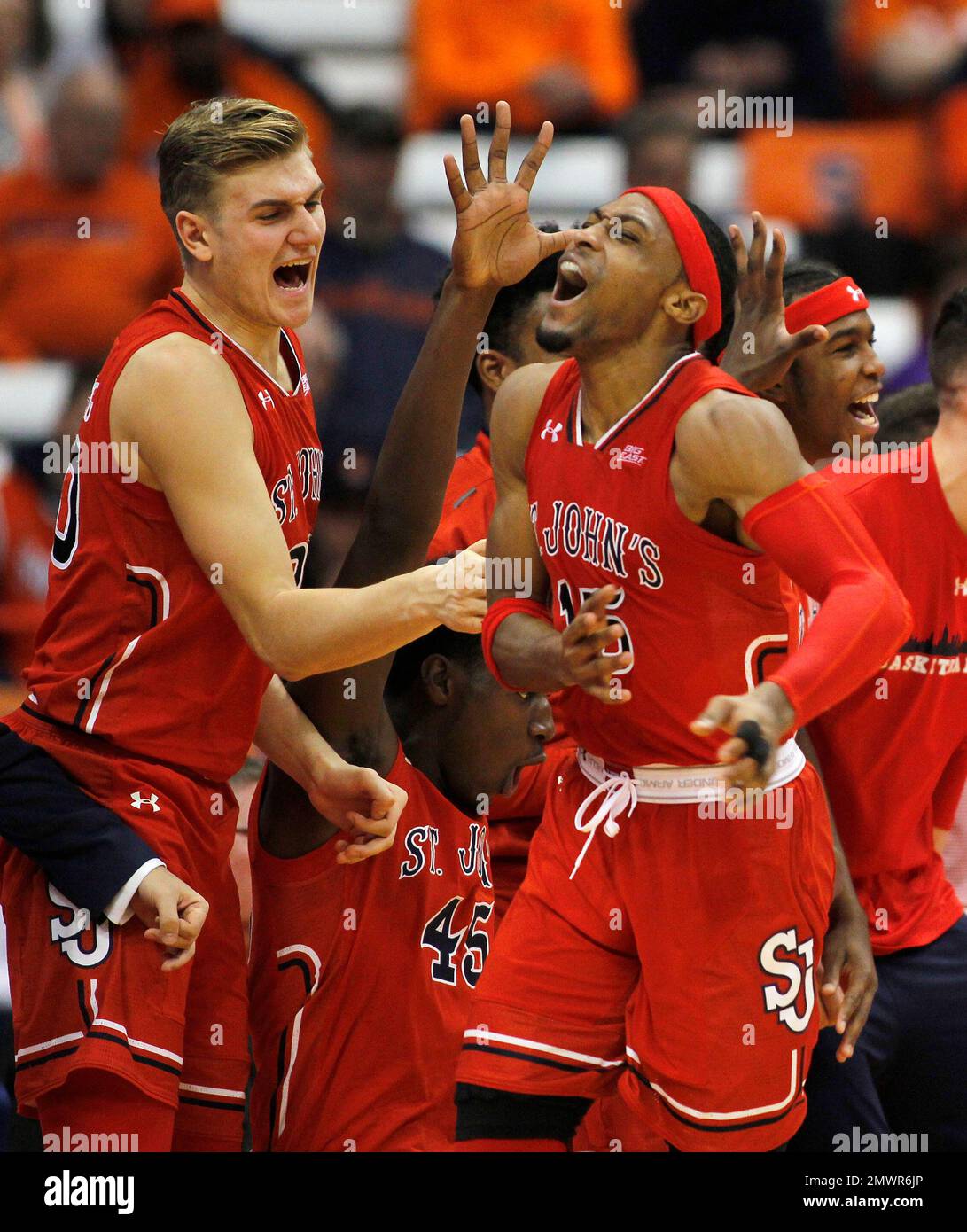 St. John's Marcus Lovett, right, celebrates with teammate Richard ...