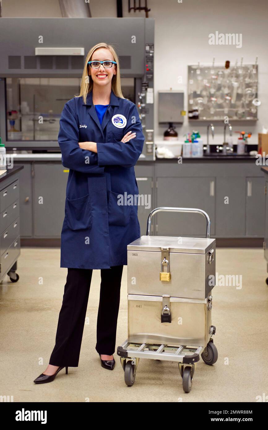 In this Aug. 9, 2016, photo, forensic chemist Emily Dye stands beside ...